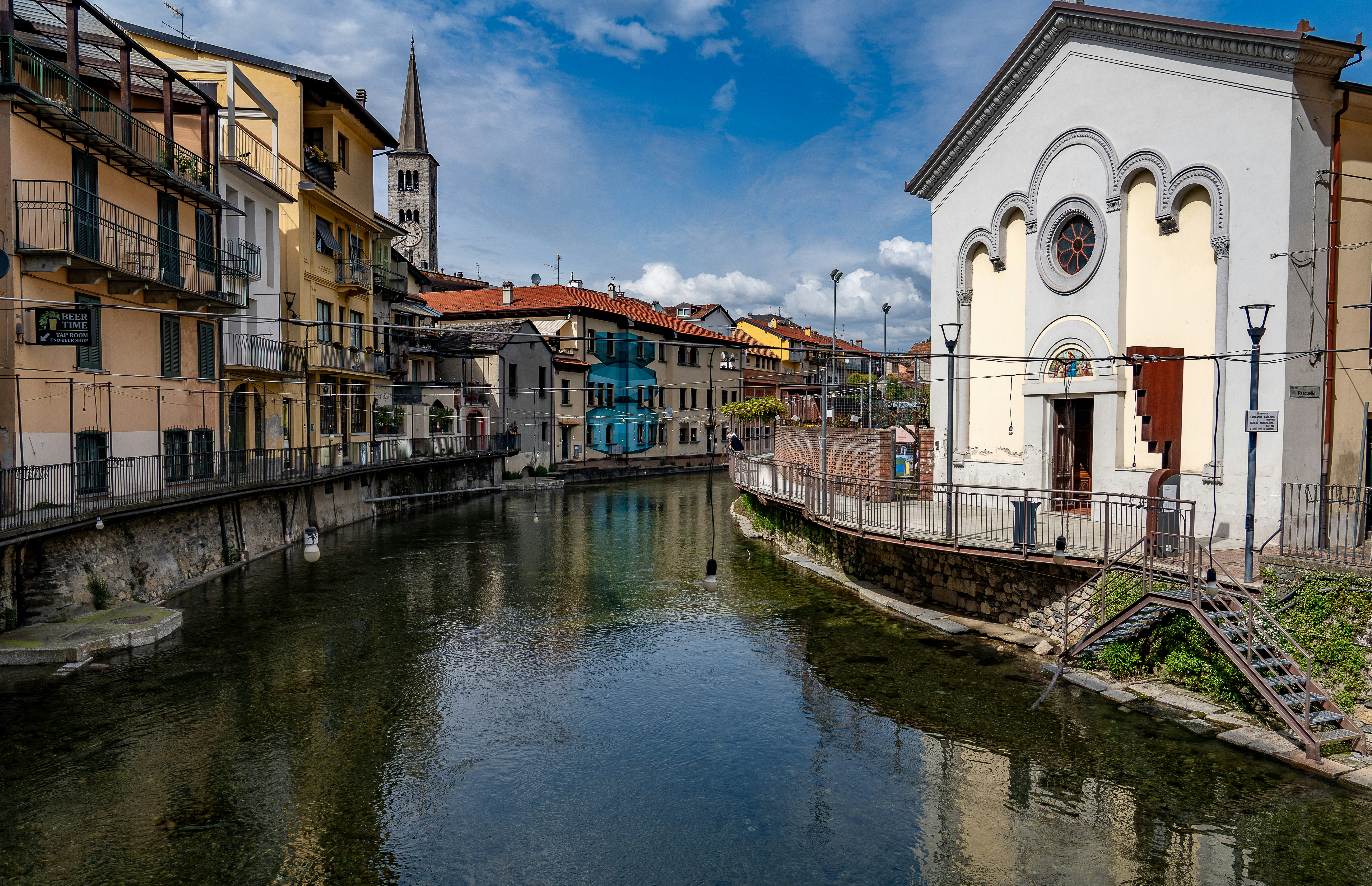 Bridge-to-Church Corridor over A Quiet Canal