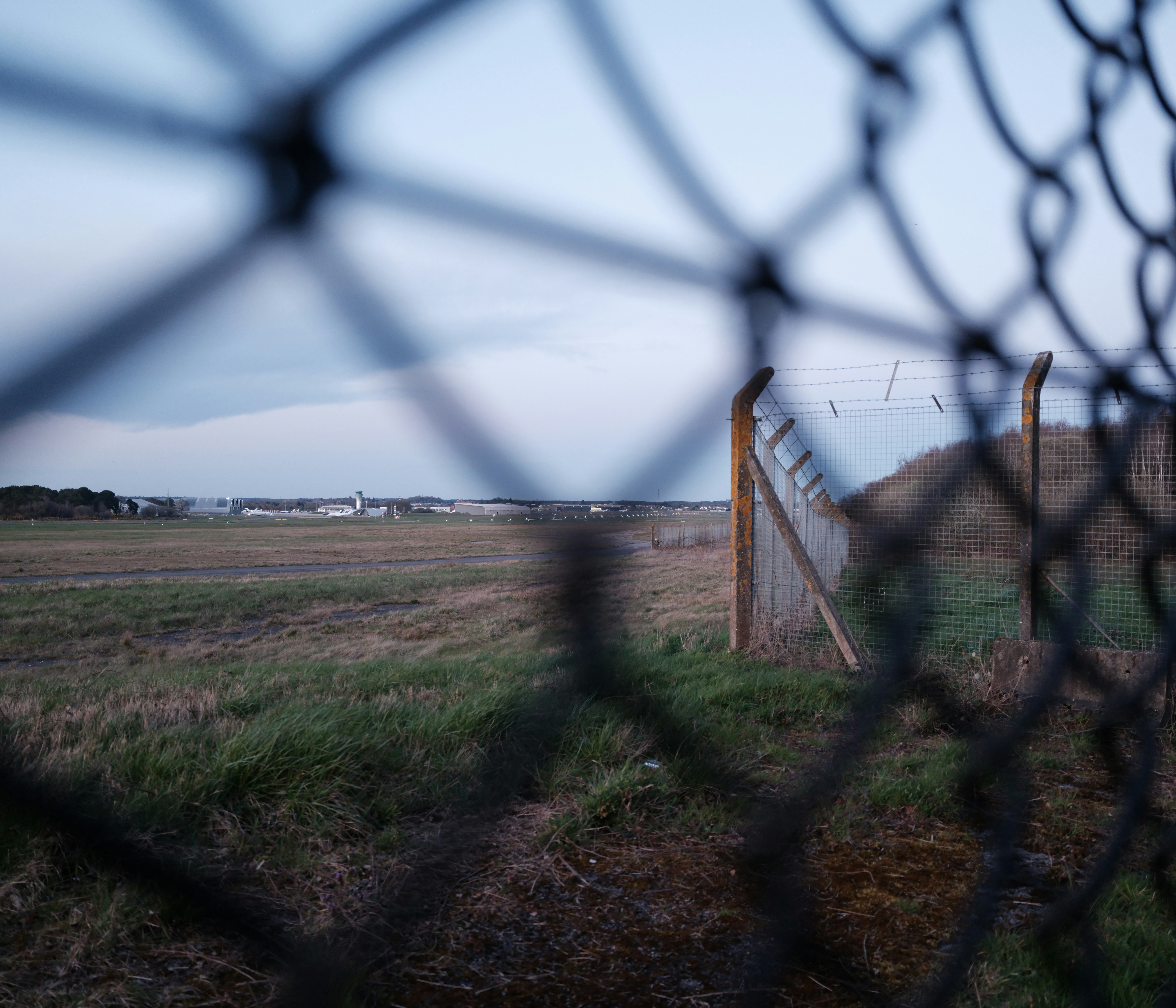 Barbed Gate to Open Field