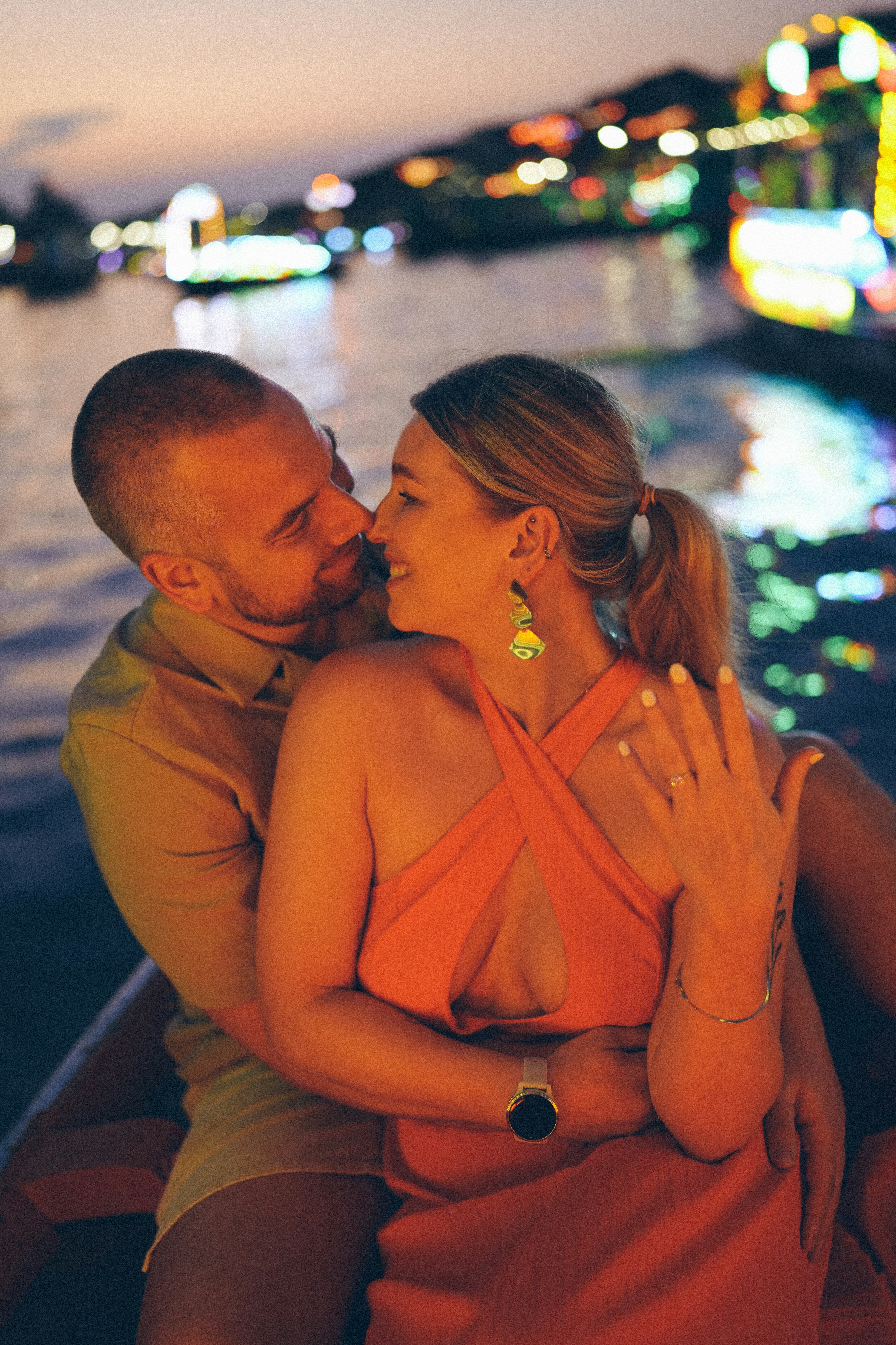 Sunset Embrace on the Water: A Quiet Moment Between Them