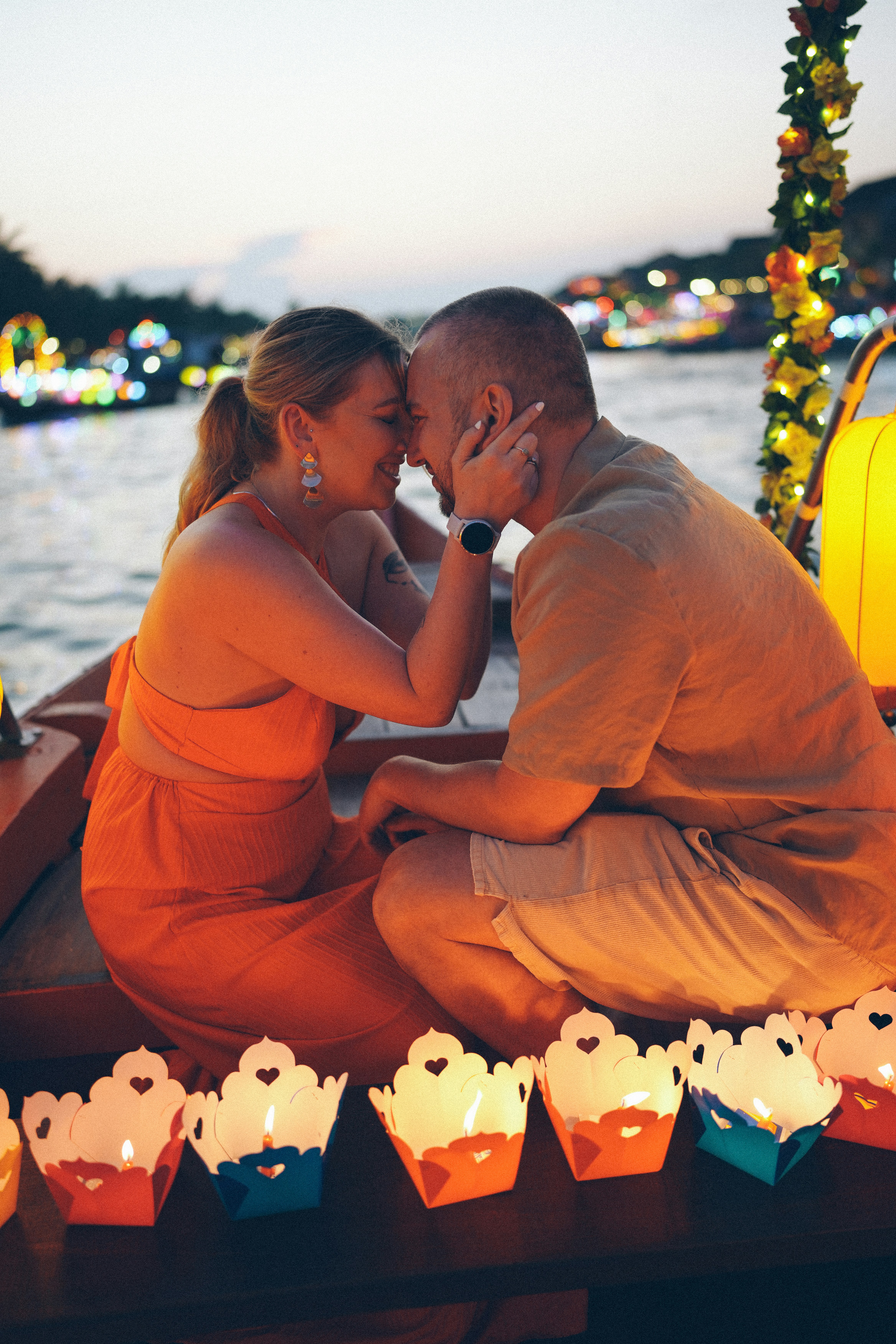 Tender Kiss on a Floating Flame-lit Night