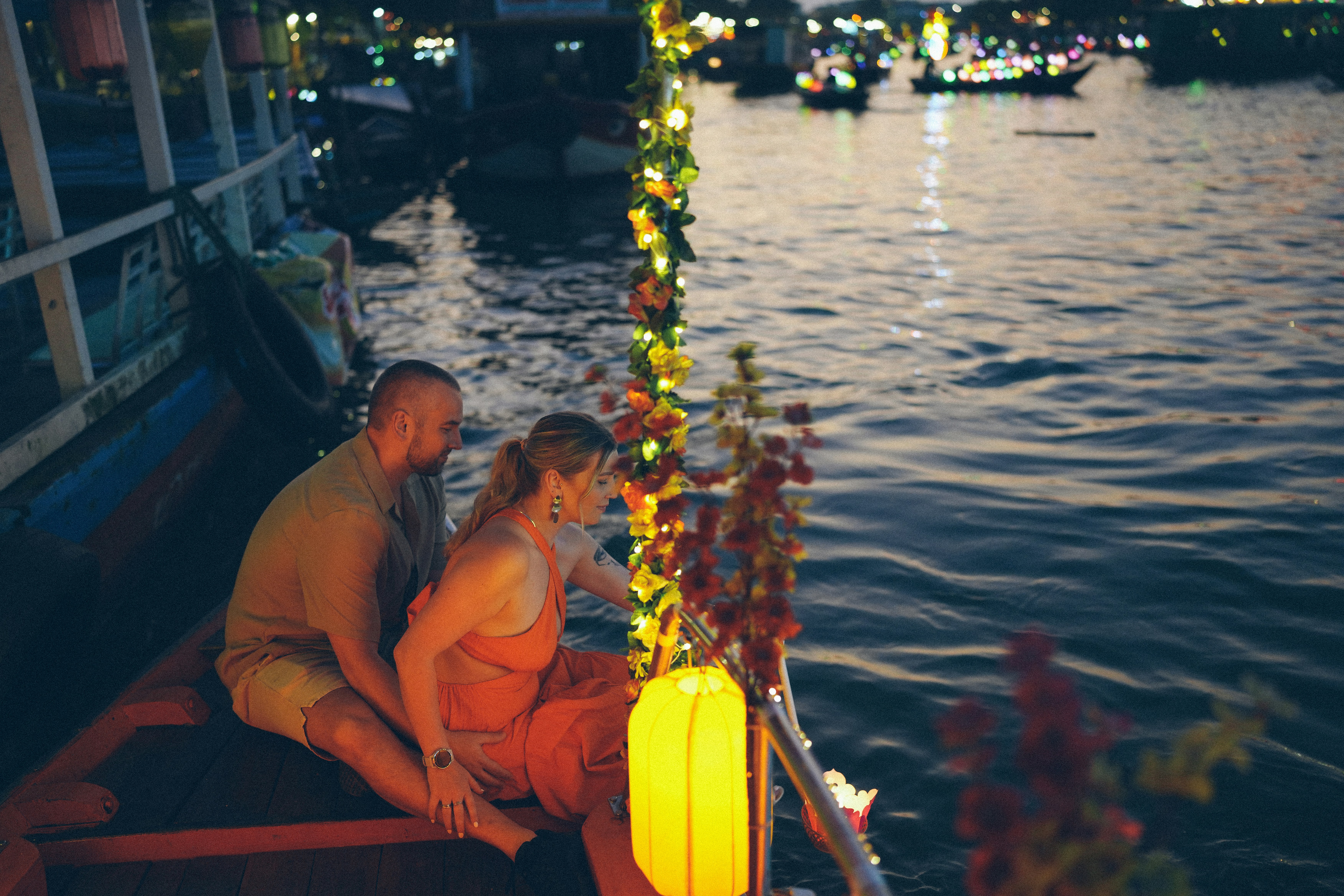 Lantern Kiss on the Waterfront: A Quiet Moment Afloat