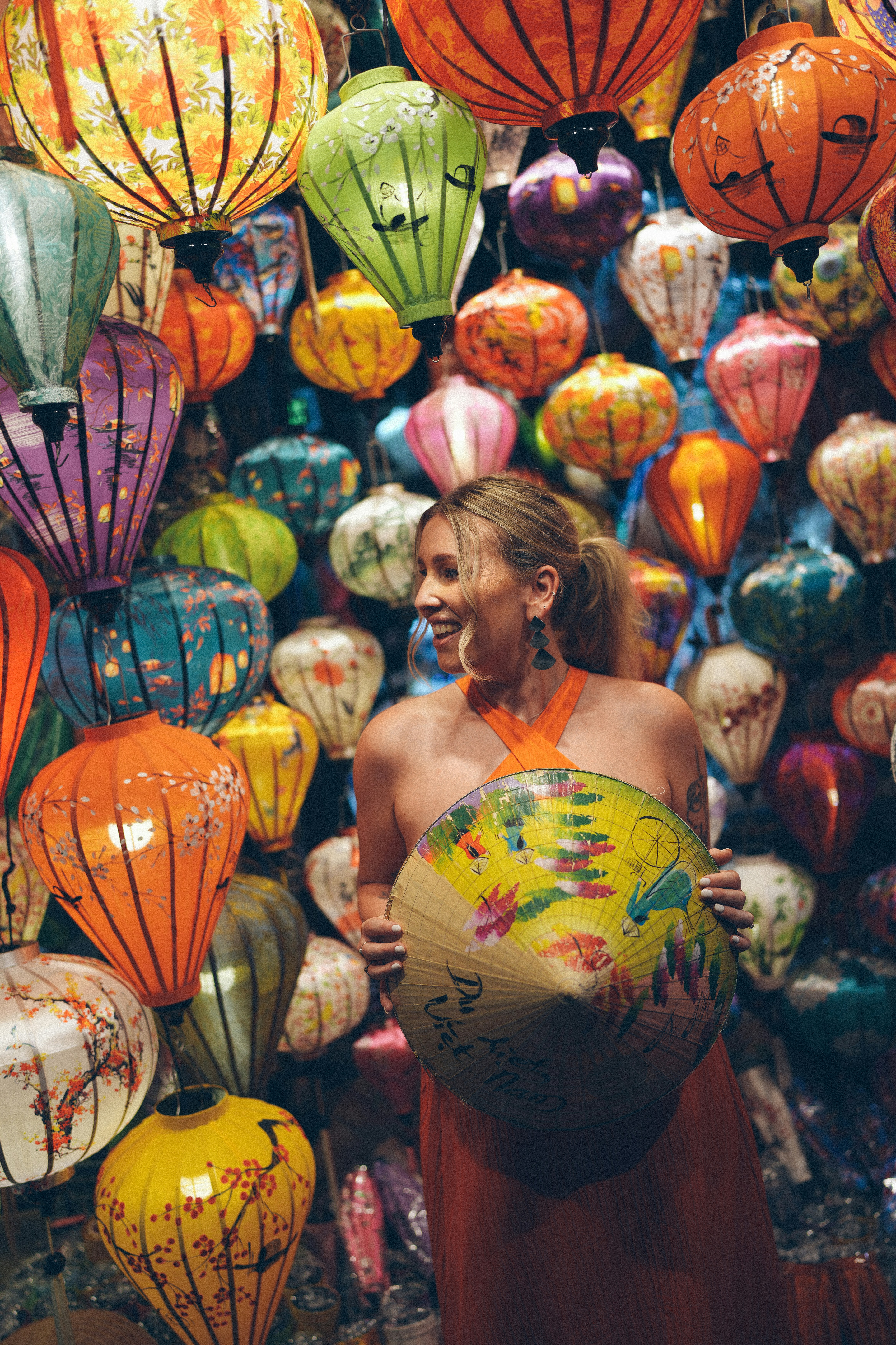 Lanterns in Bloom: A Portrait Amid Colorful Orbs