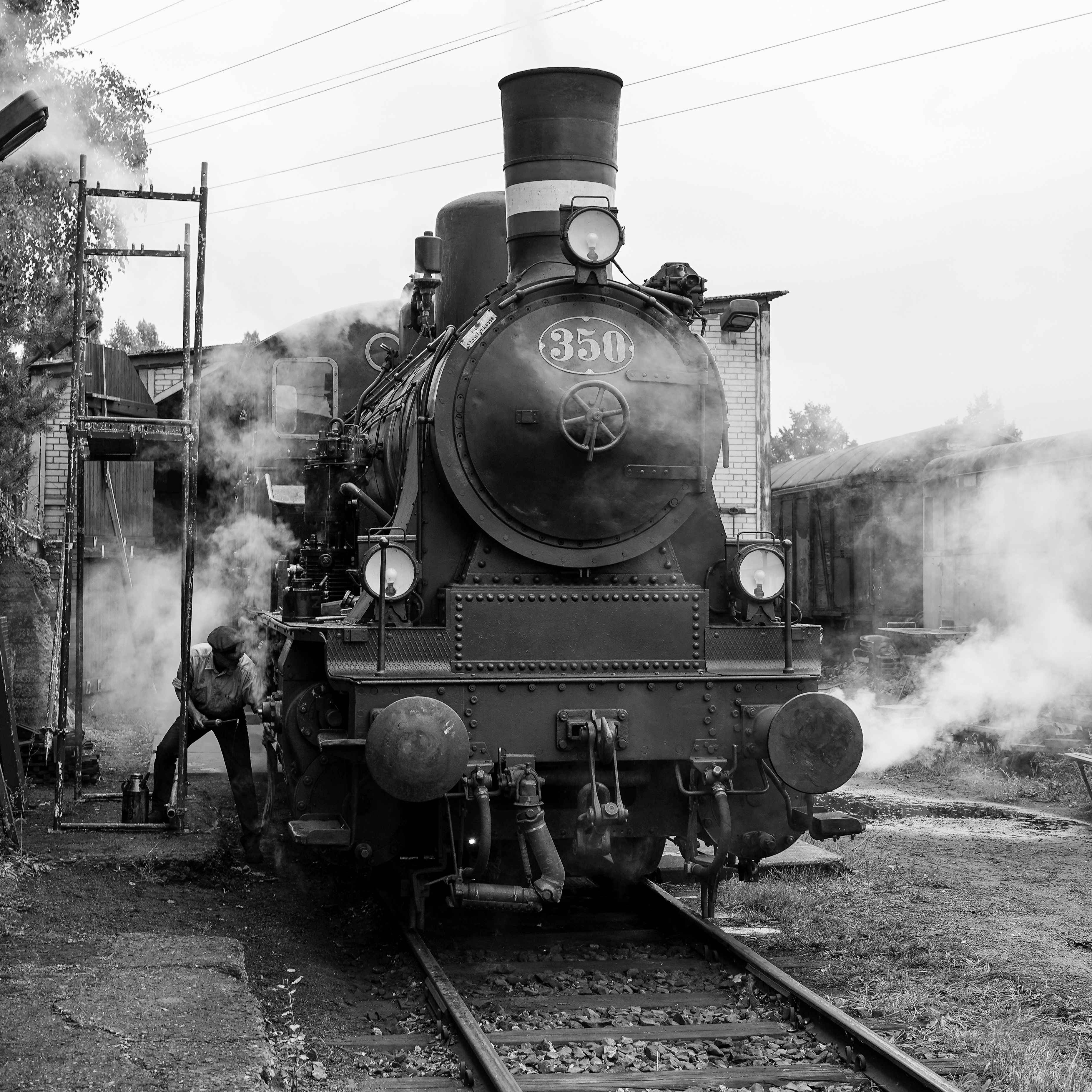 Iron Giant at Dusk: Steam, Steel, and Smoke Along the Rails