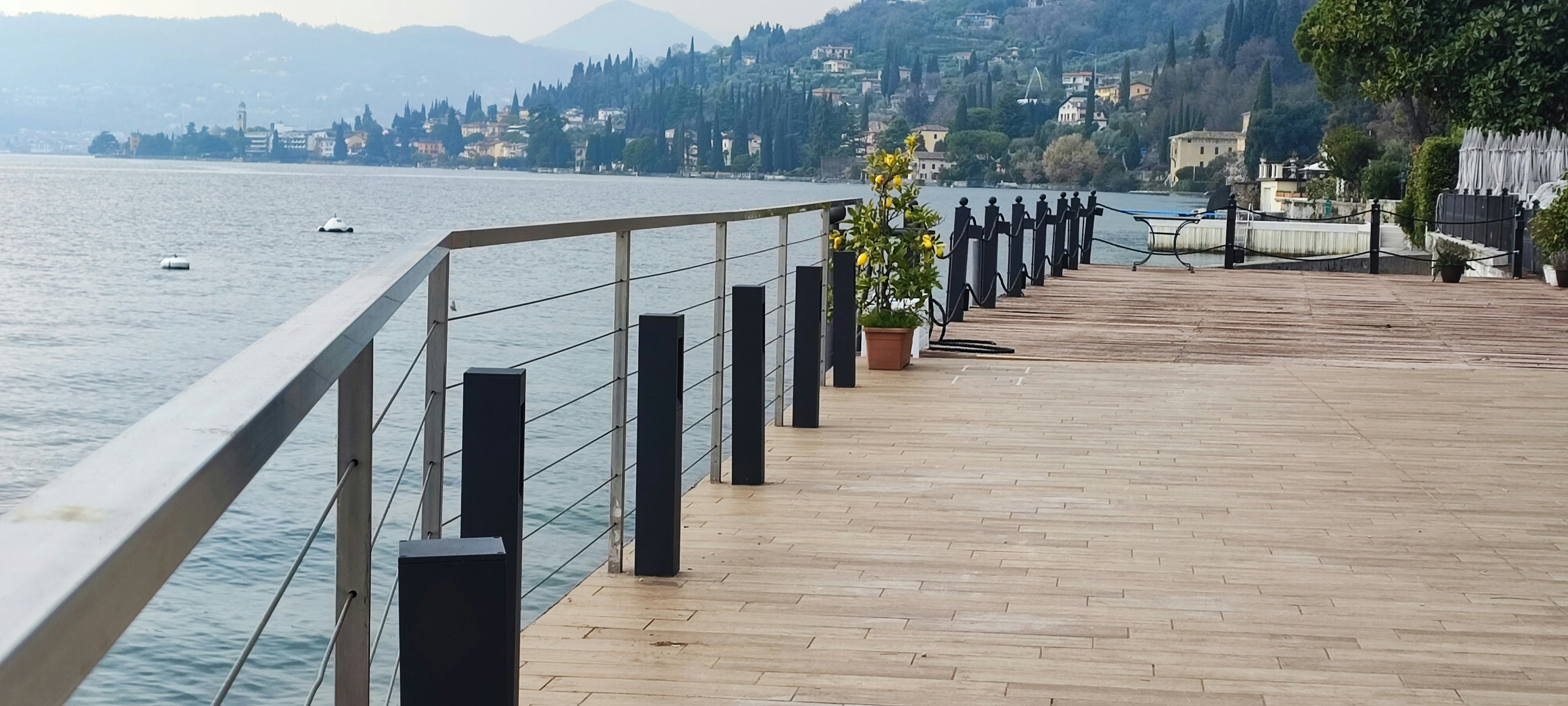Lakeside promenade stretching into the horizon