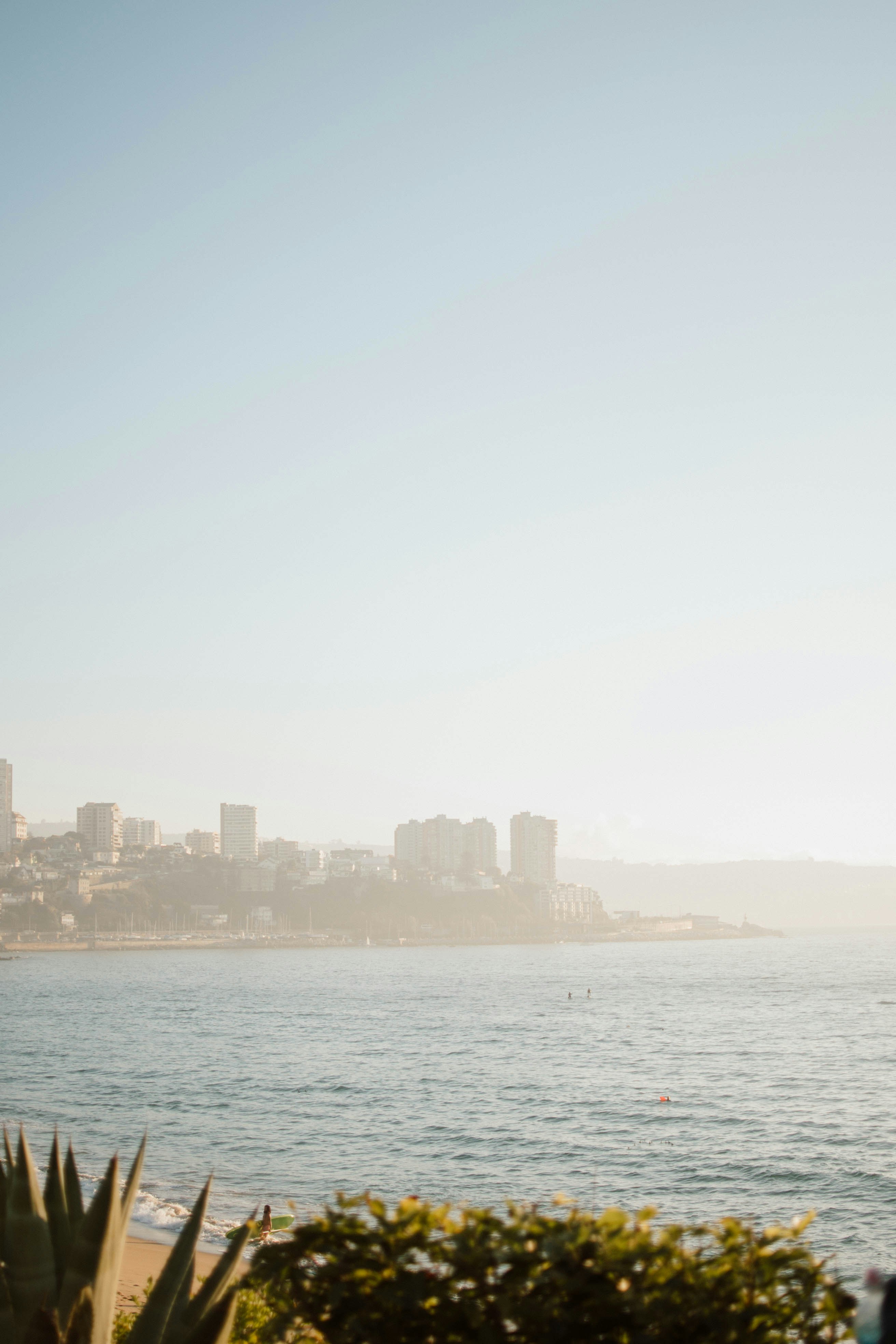 Horizon Glow Over a Quiet Seaside City