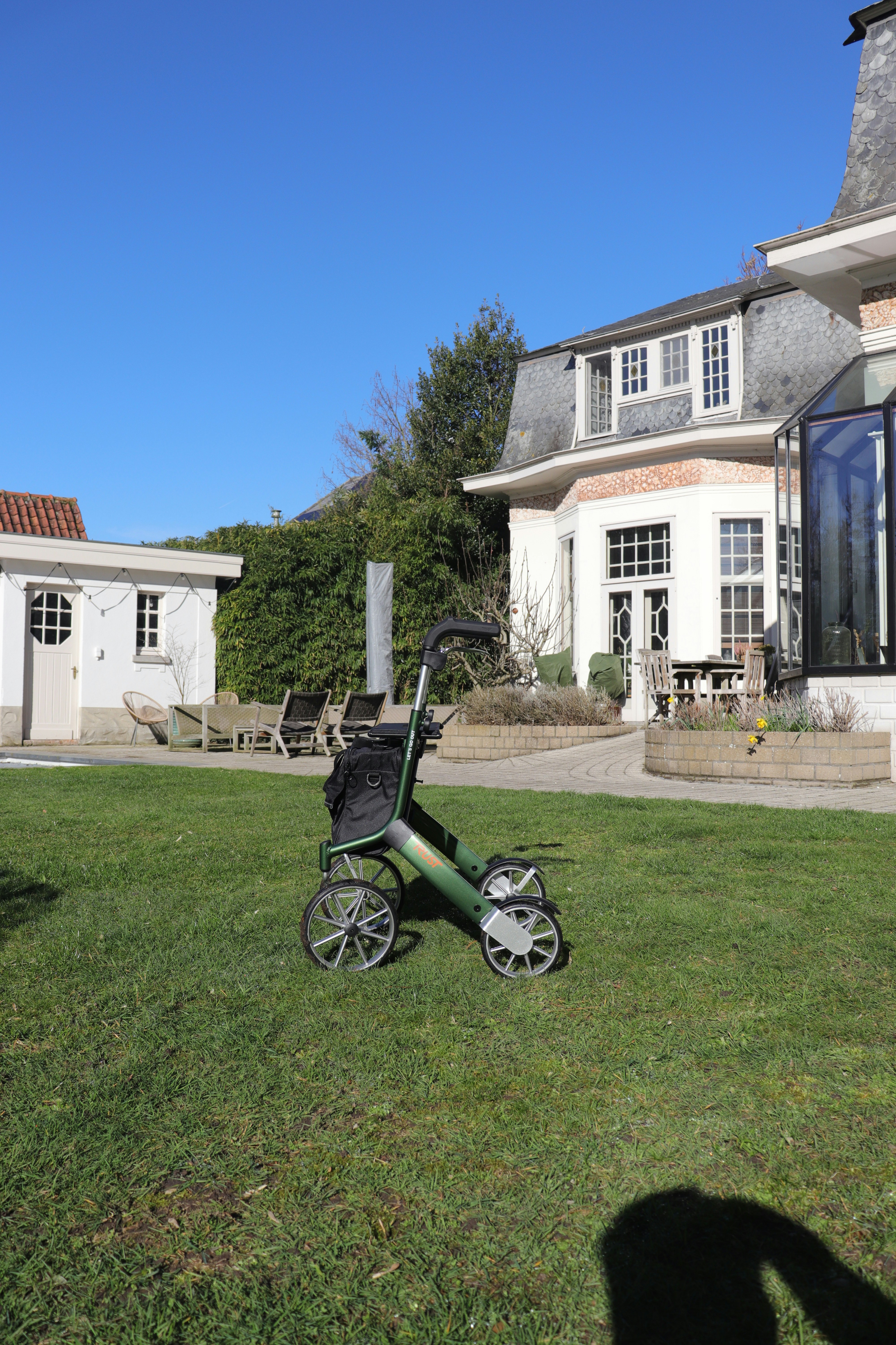 Garden Expanse with a Stroller on Quiet Afternoon