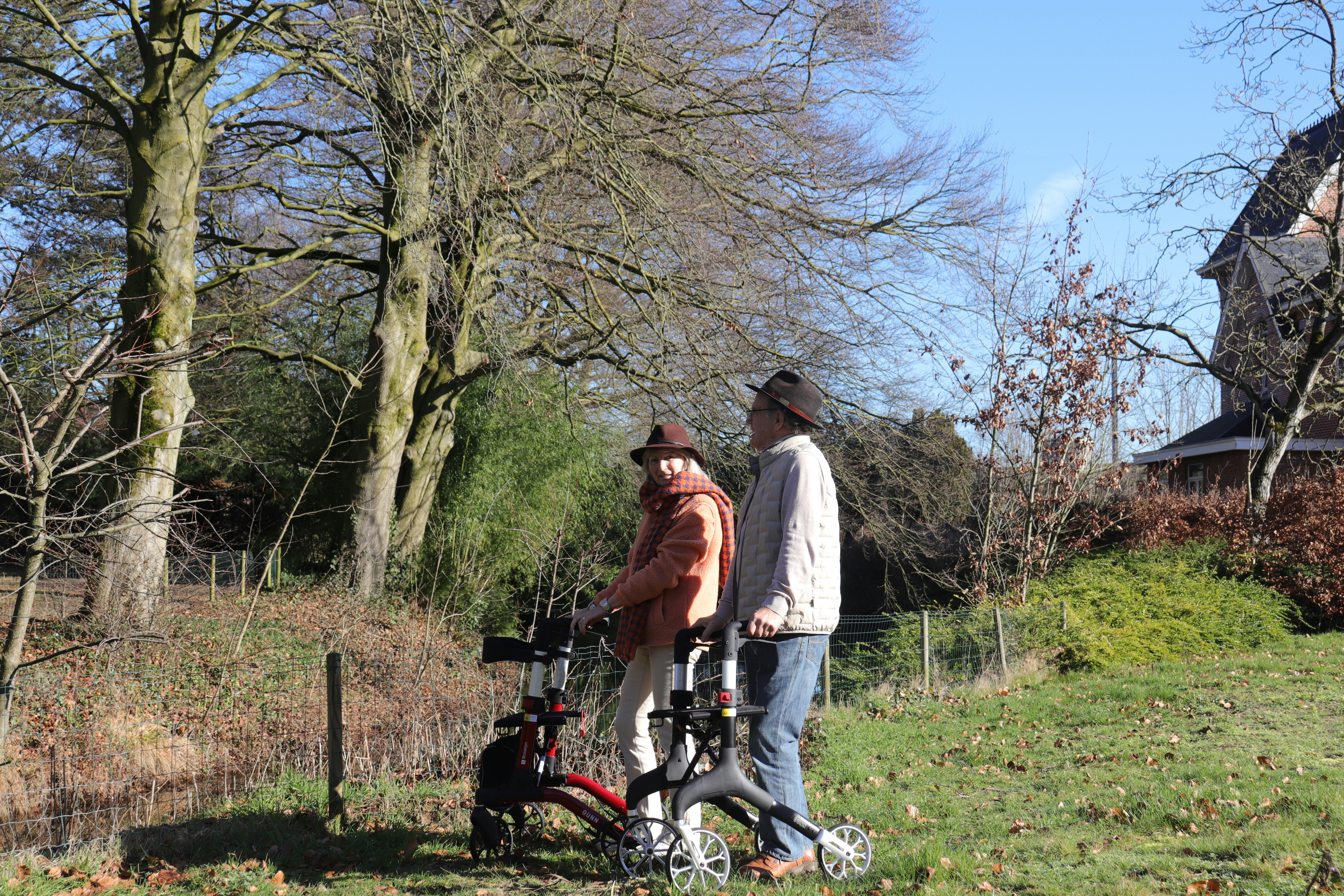 Two Strollers, One Sunny Path: A Quiet Moment in the Park