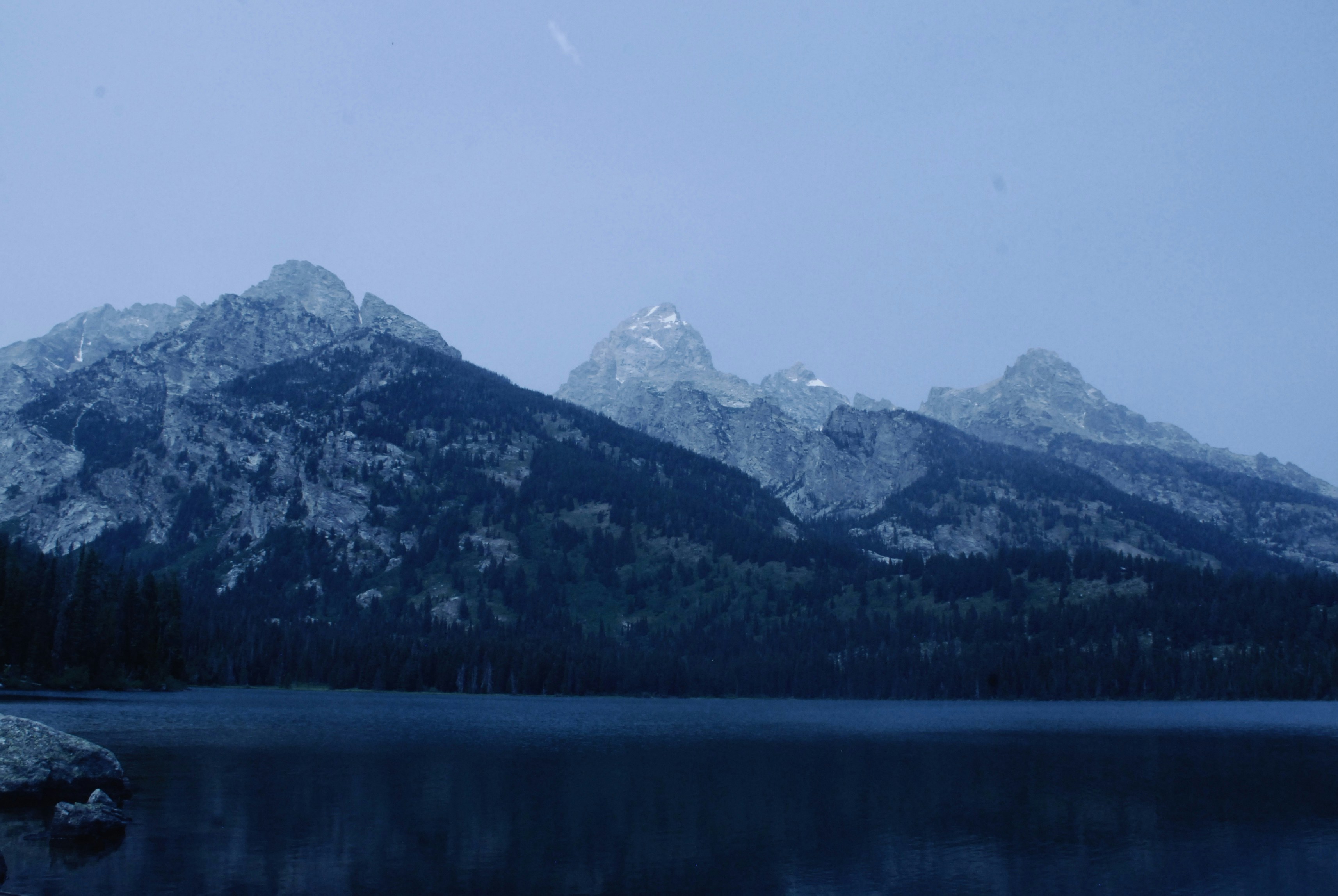 Moonlit Peaks Over Still Lake