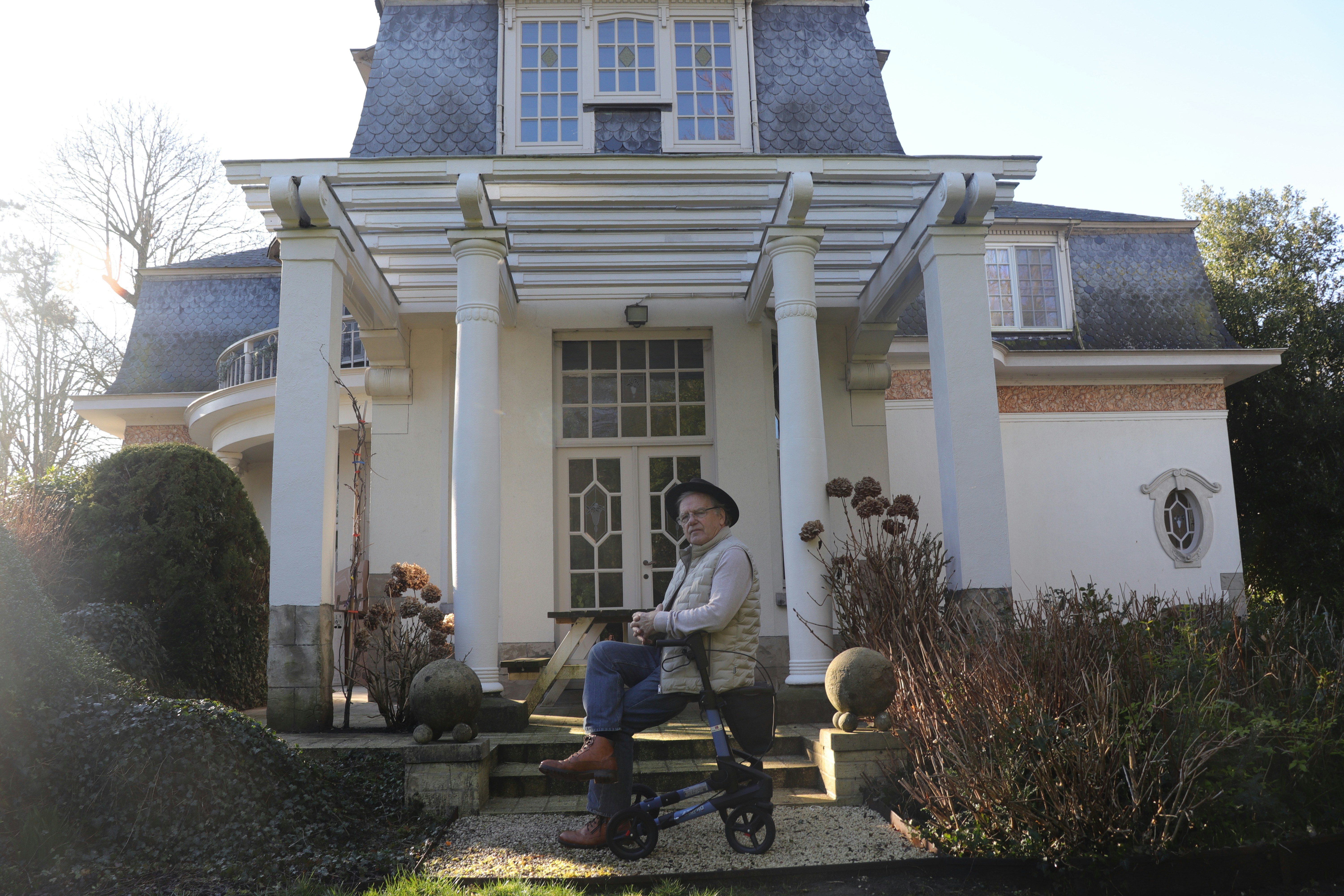 Porch Portrait: A Quiet Moment on the Grand Steps
