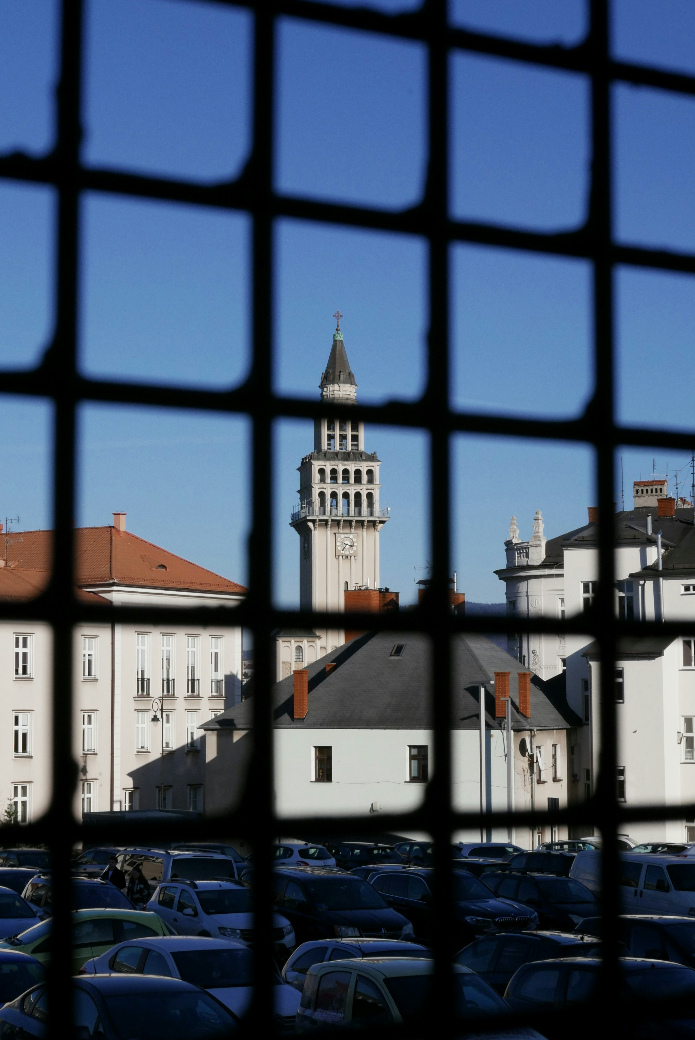 Clocktower Vista Through a Grid of Shadows