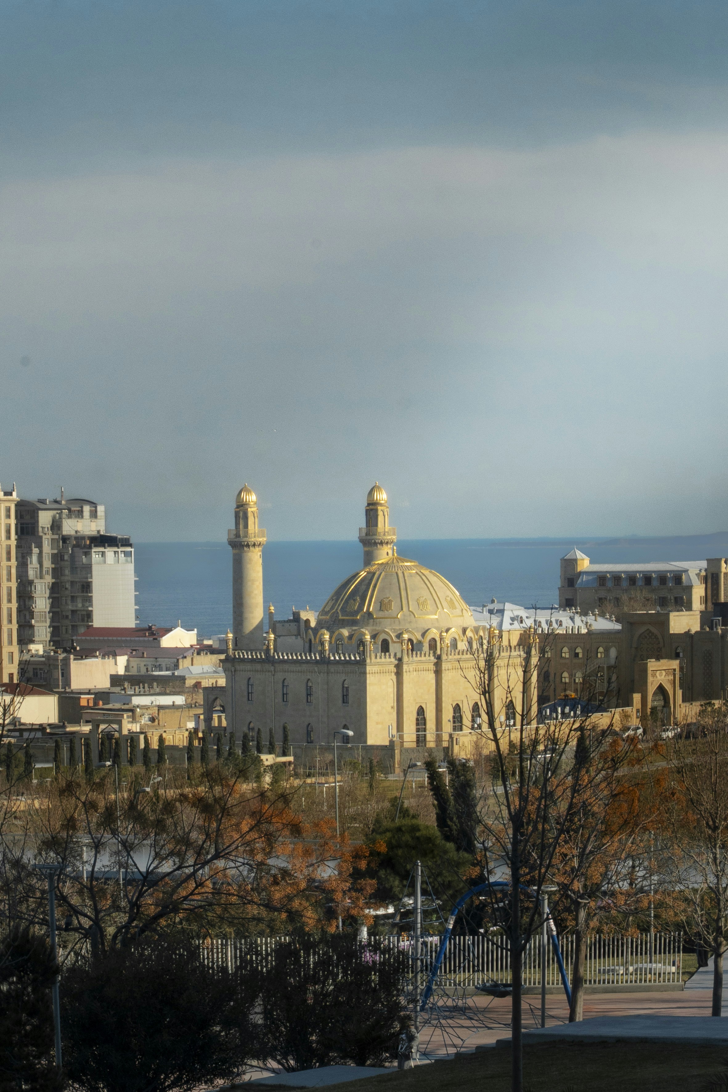 Golden Dome on the Waterfront: Cityscape with Maritime Sky