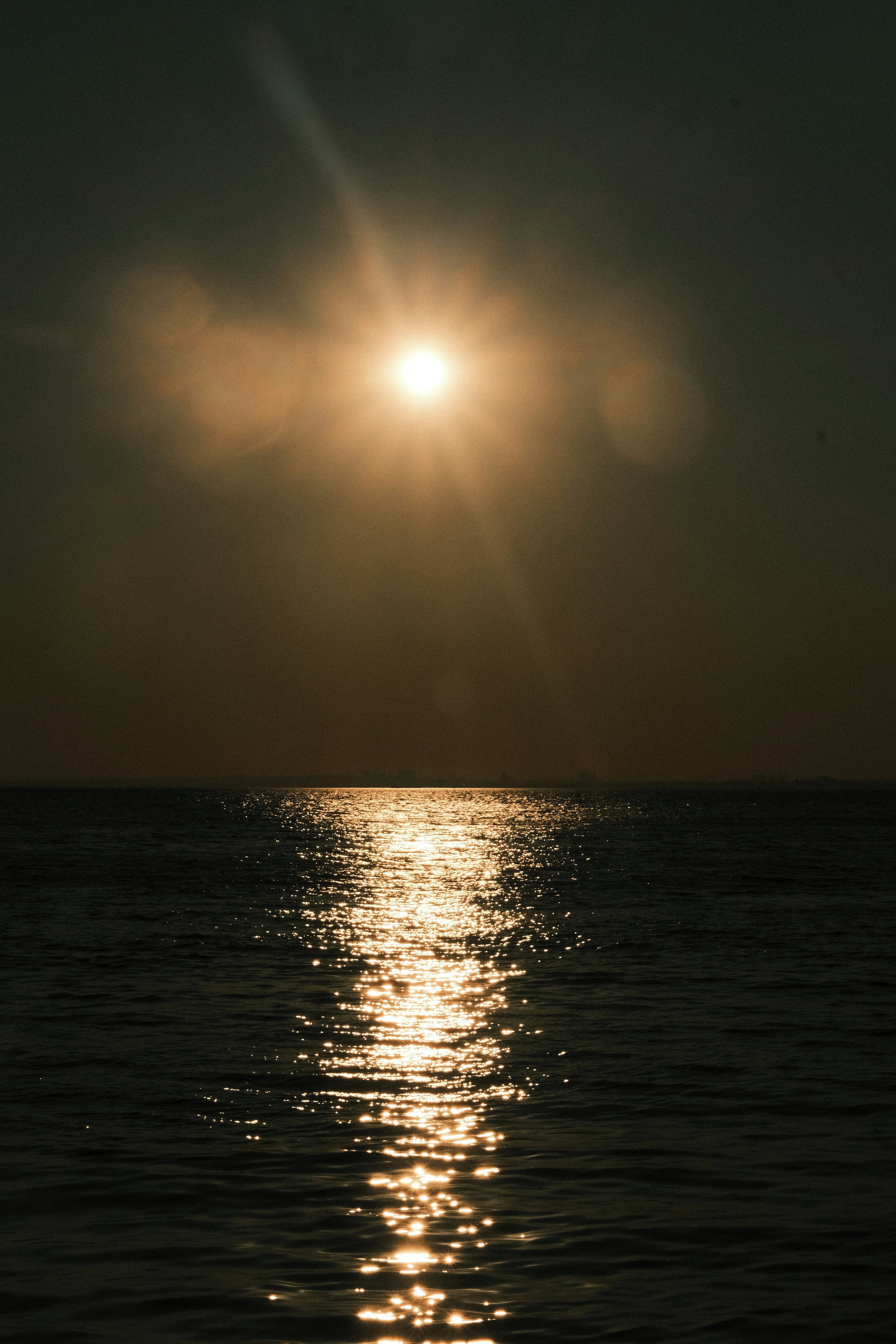 Sunlit Ripple: Evening Calm Over a Quiet Horizon