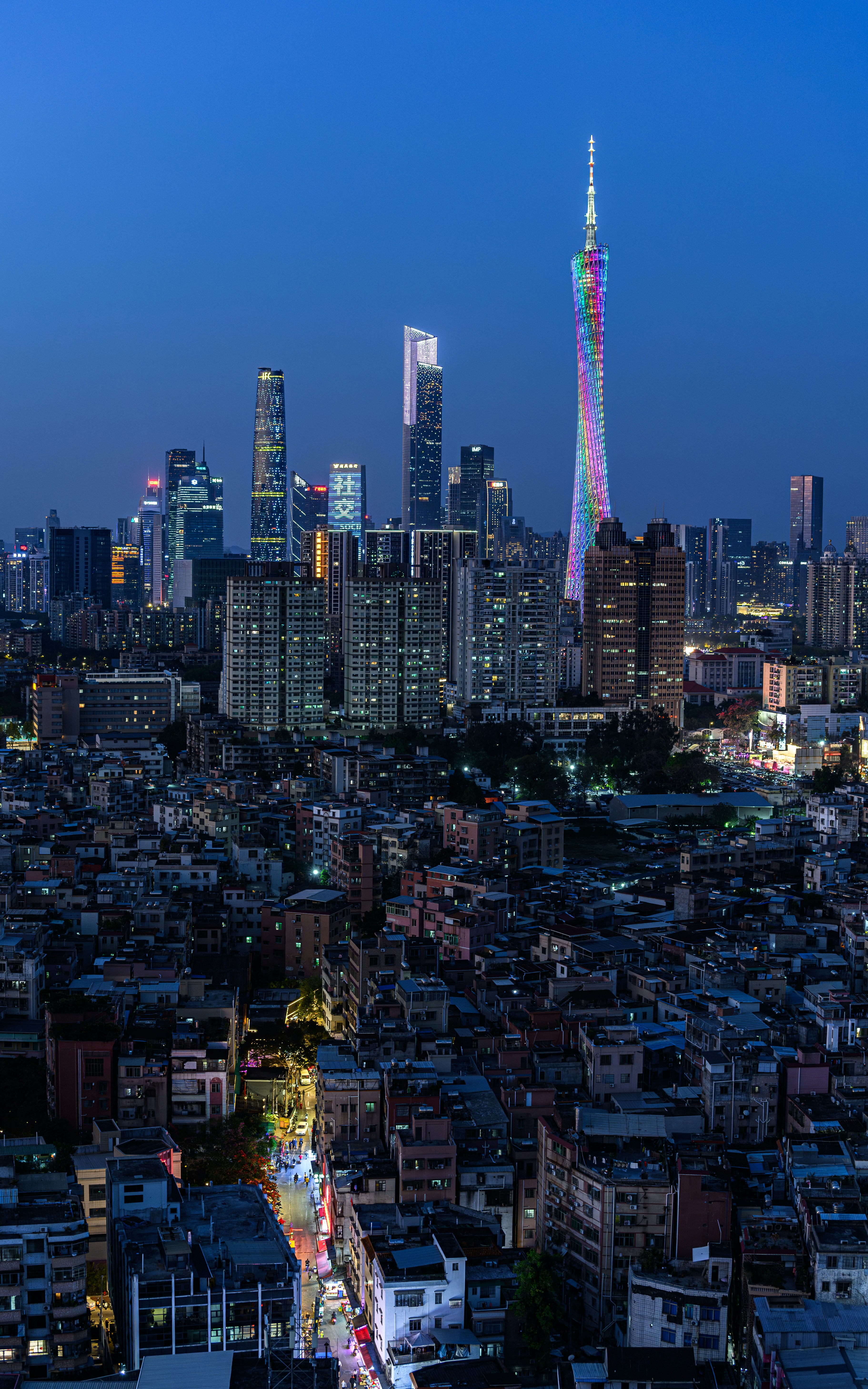 Neon Needle: Taipei Skyscraper Crowned by Rainbow Lights