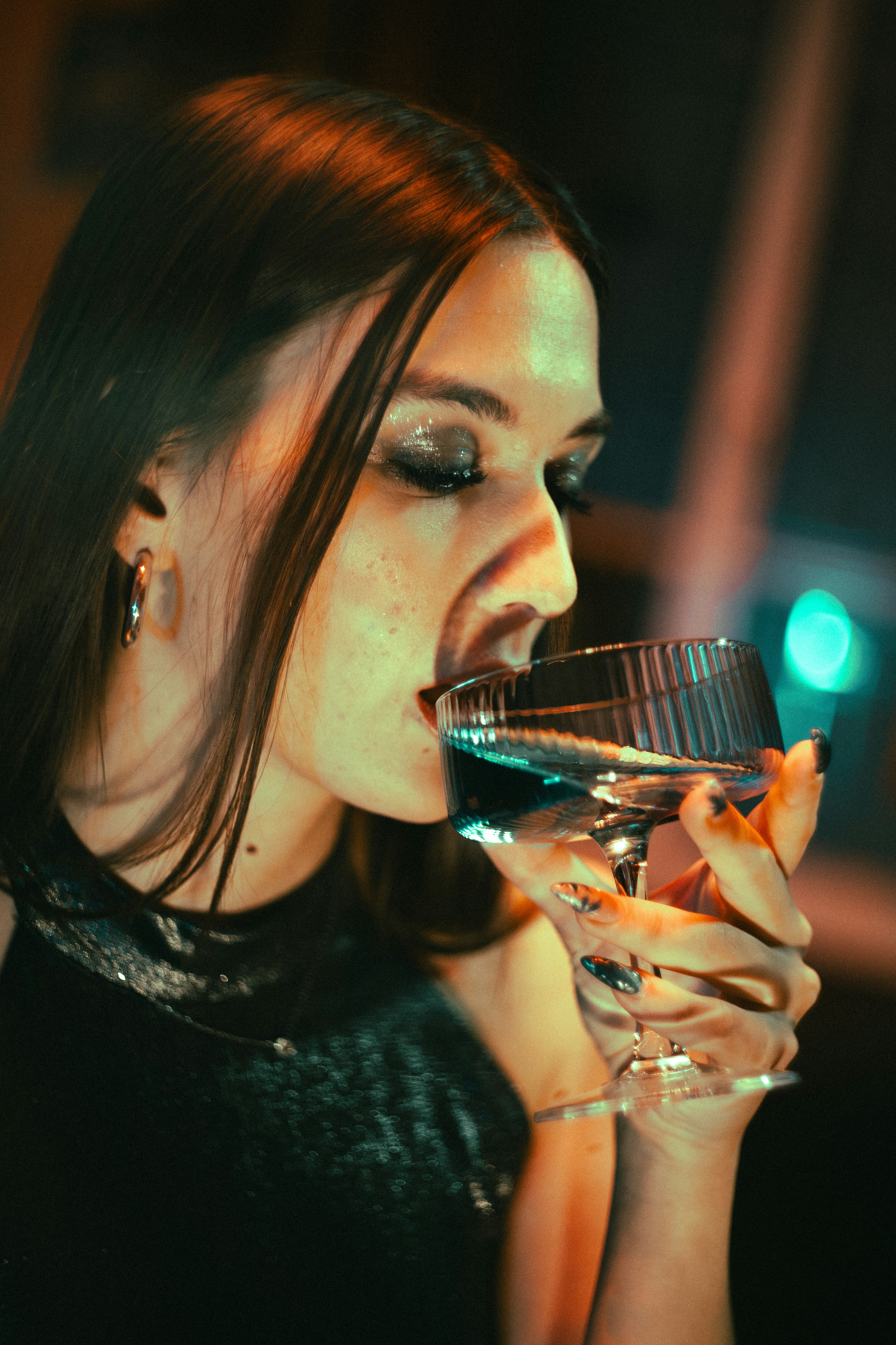 Glass and Glamour: A Nighttime Toast