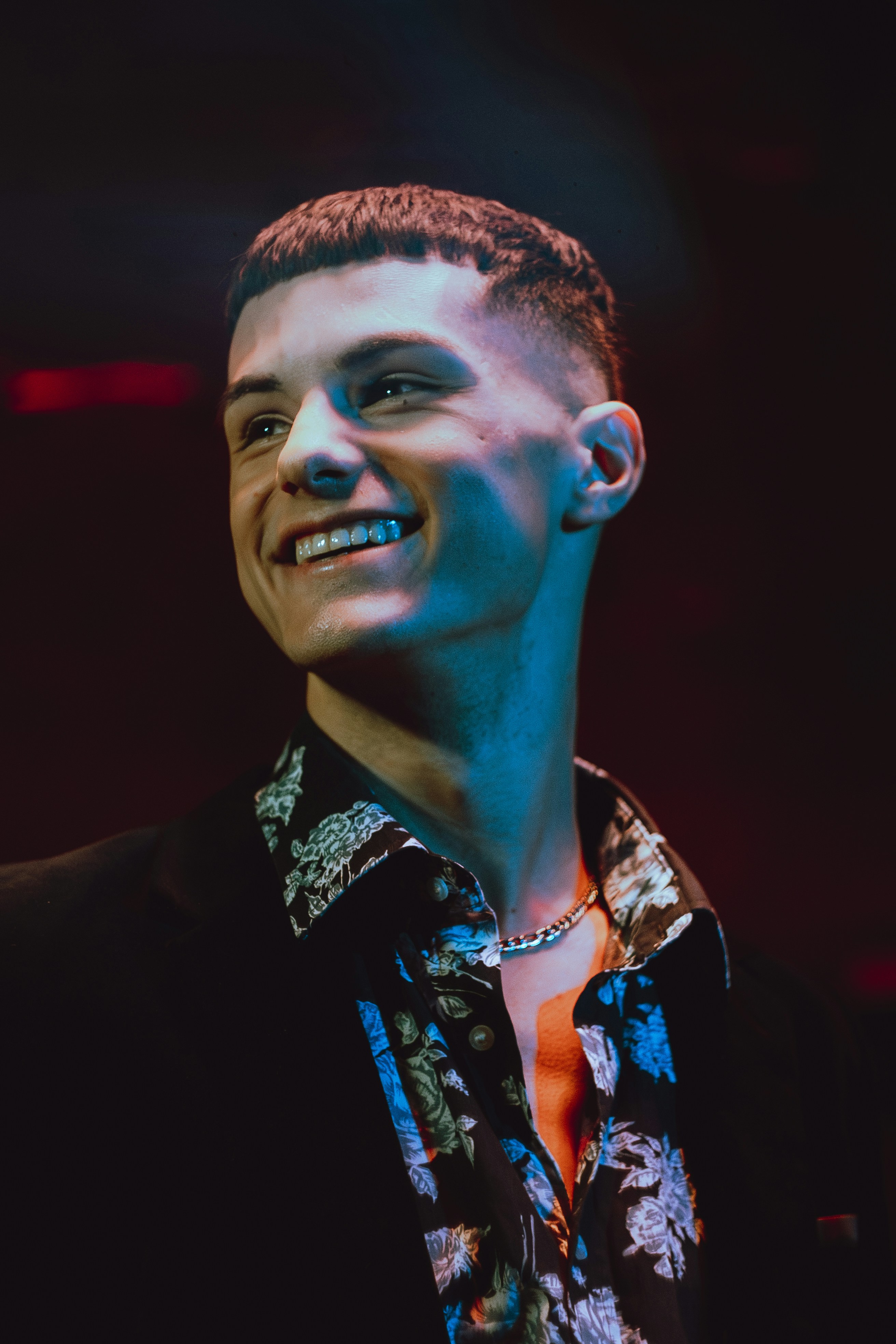 Smiling Moment Under Neon Blues