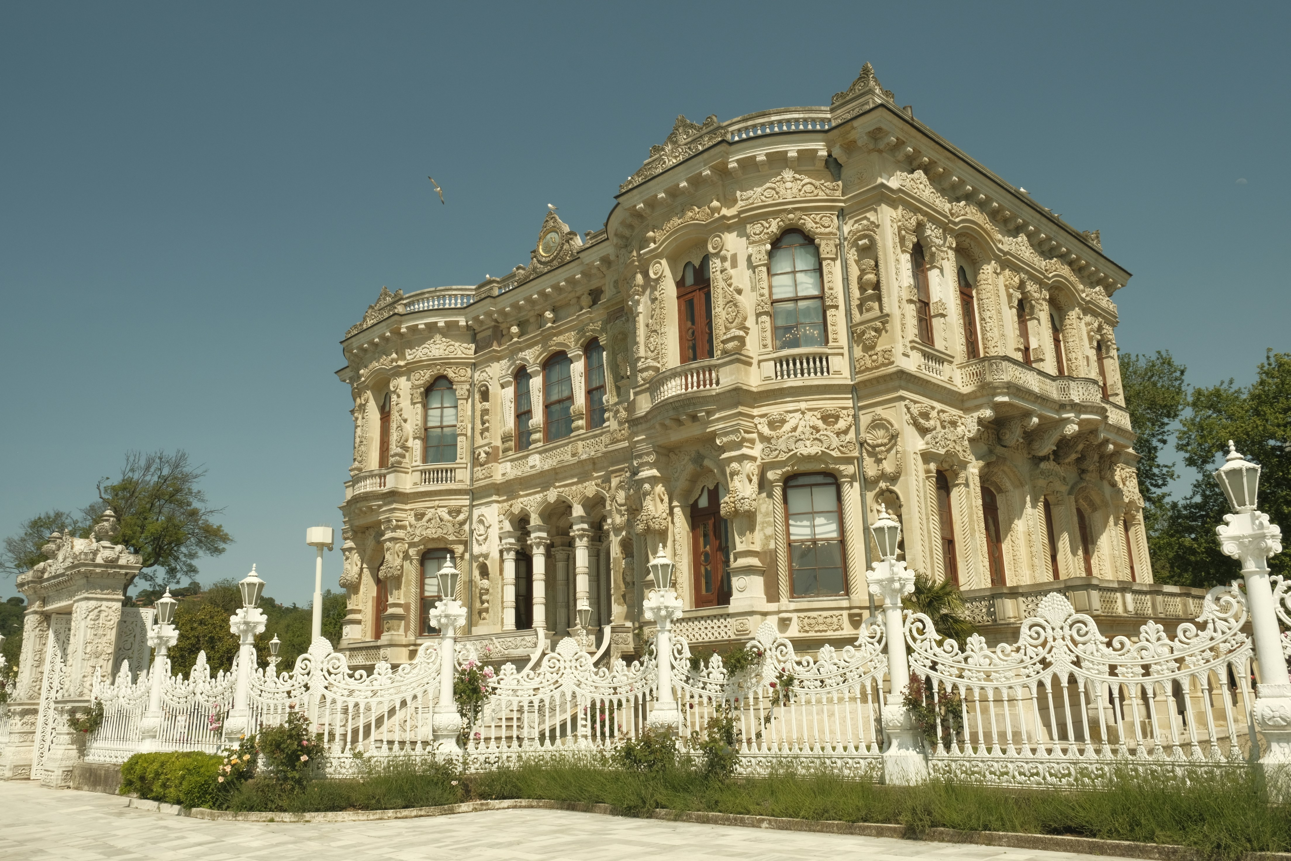 Ornate Villa Rising from a White Lattice Terrace