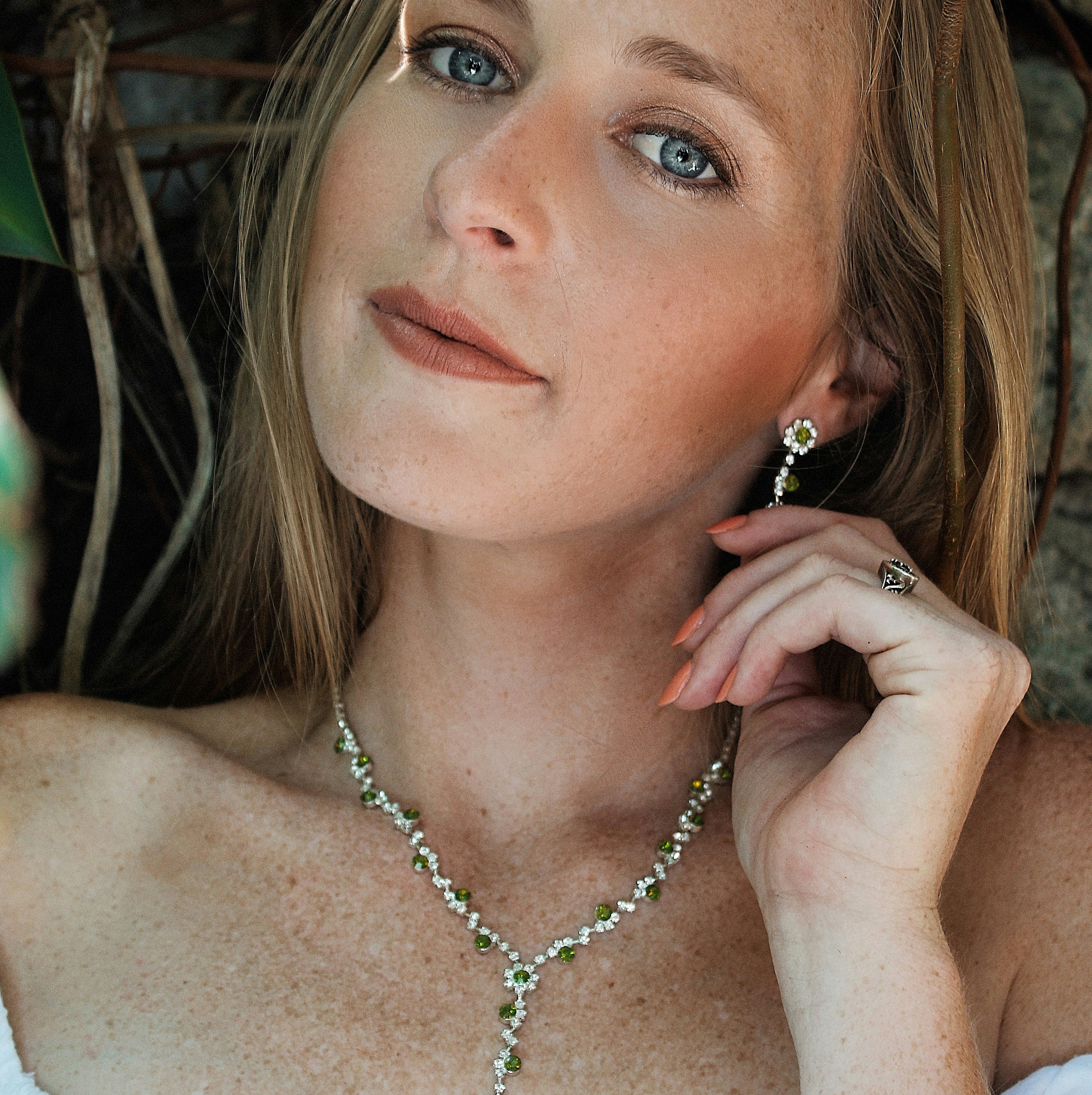 Gleaming Poise: Jewels Framing a Quiet Portrait
