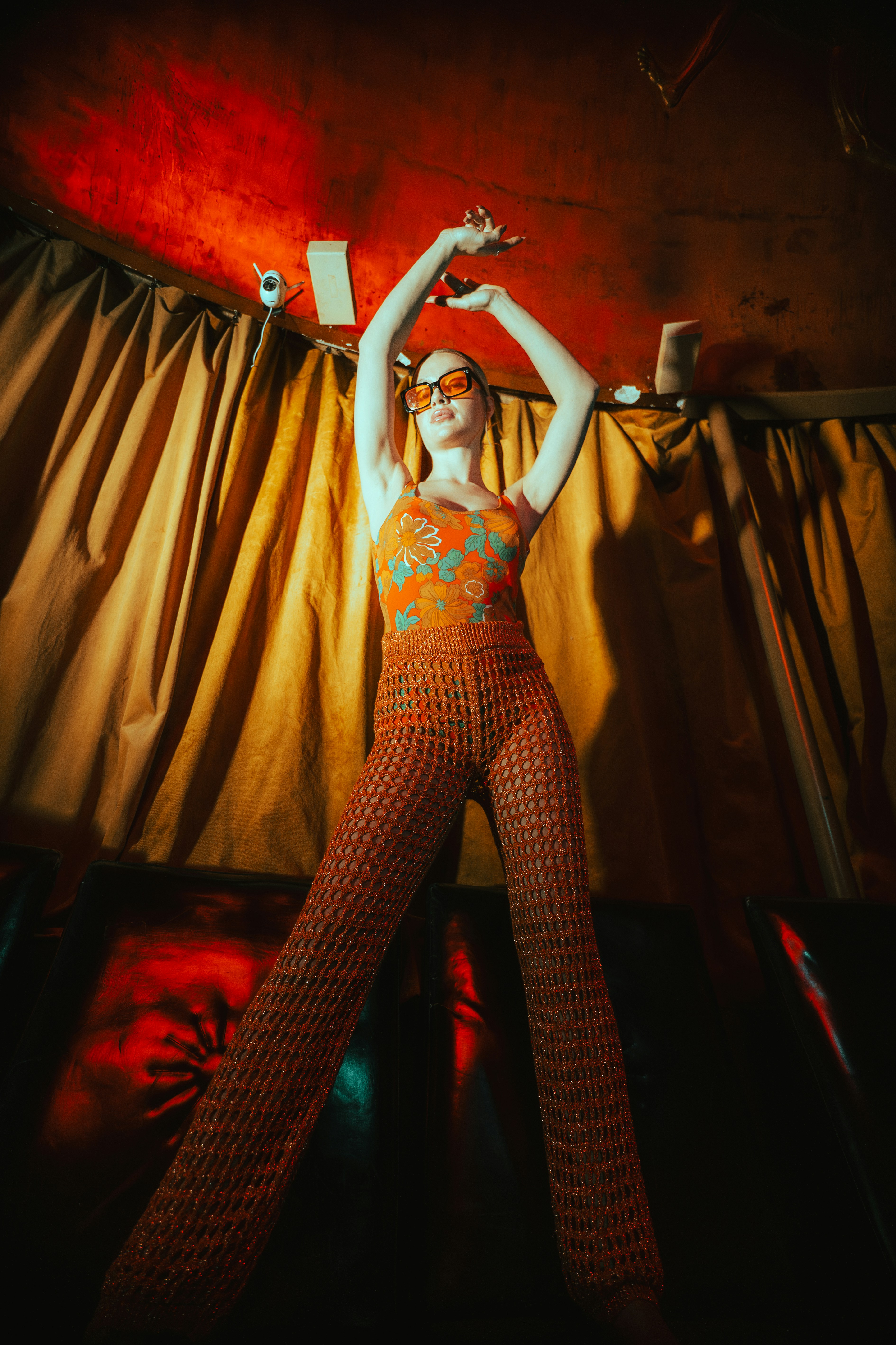 Groove Under Blacklight: Retro Jumpsuit in Neon Spotlight