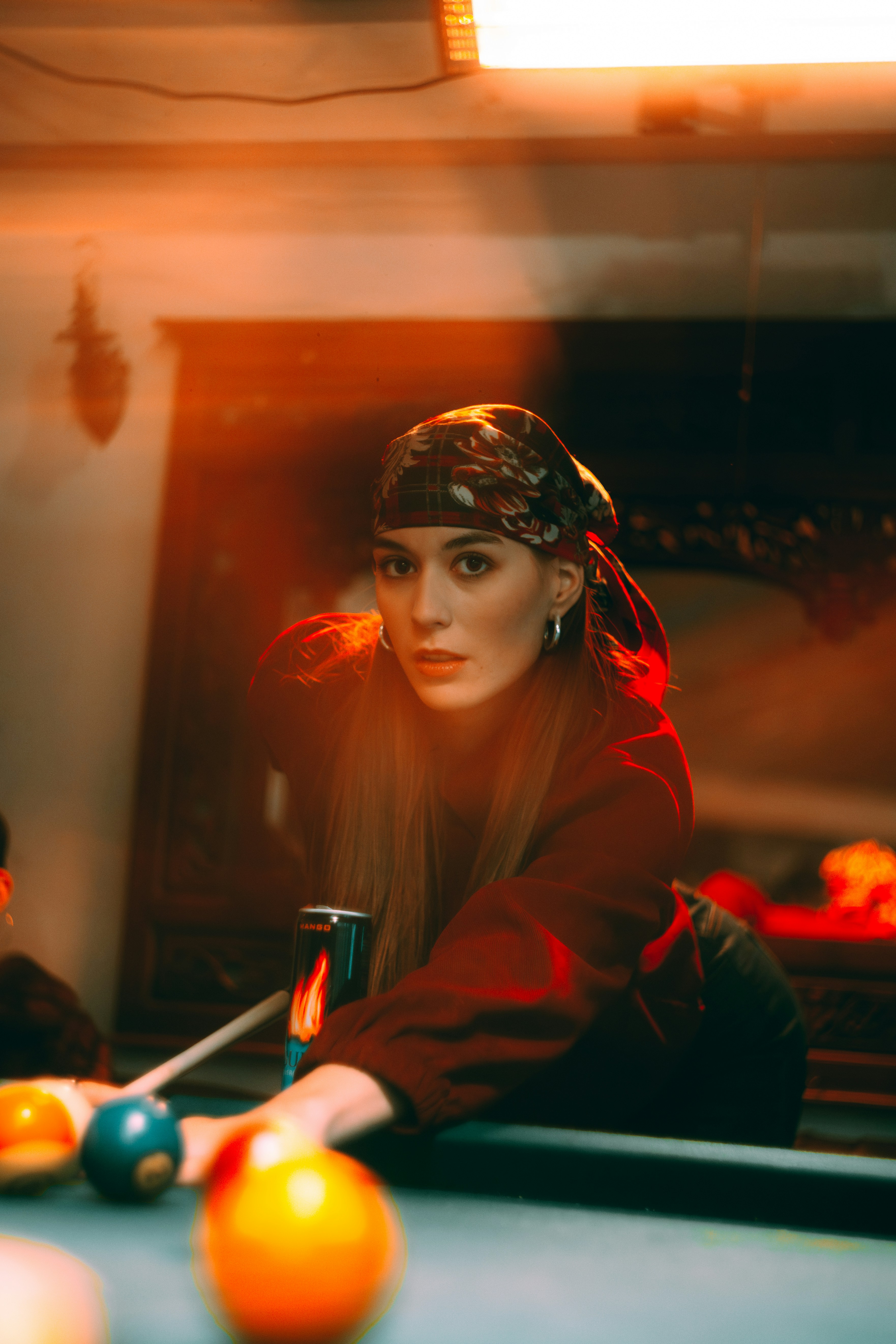 Midnight Cue: A Piercing Gaze at the Bar's Edge