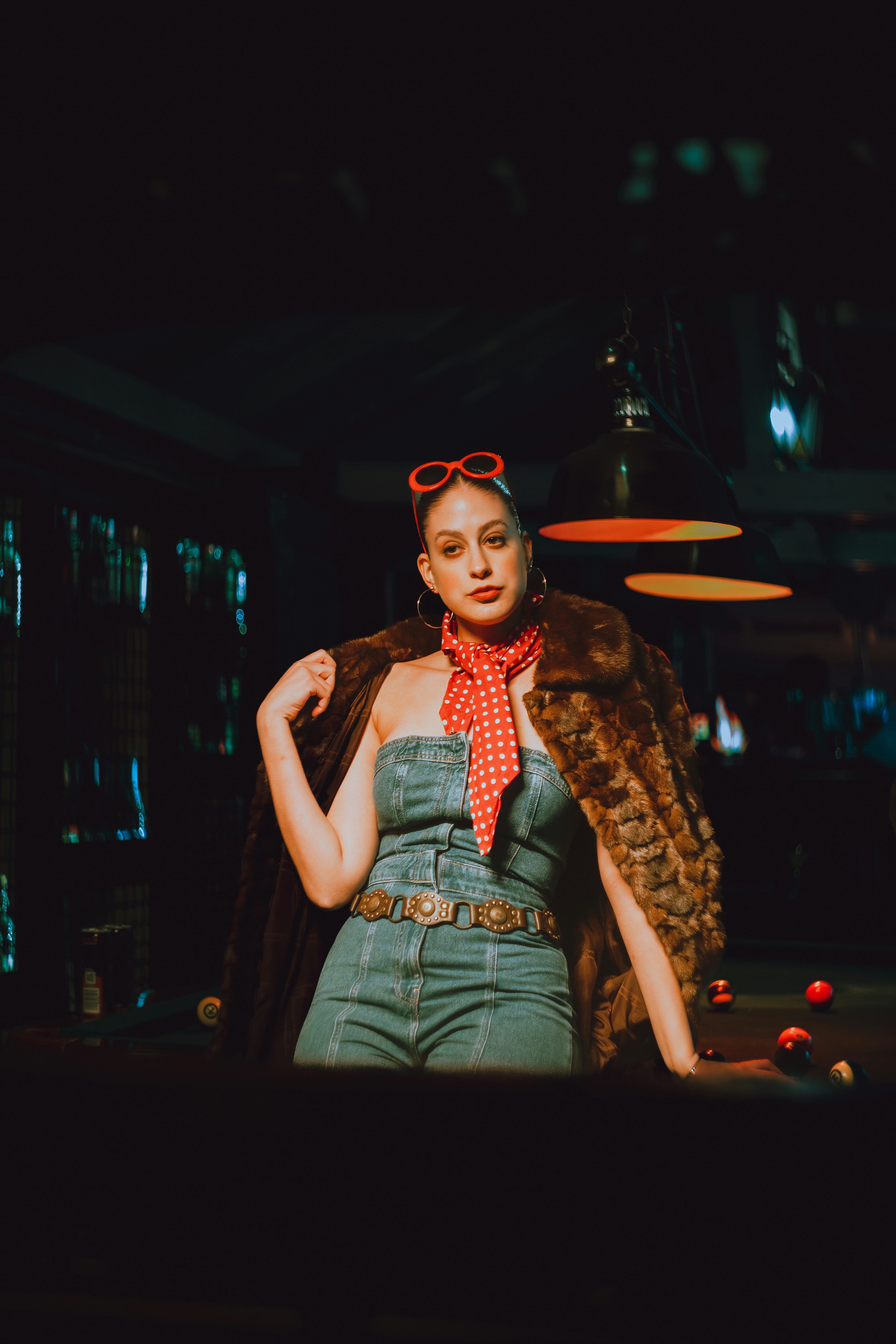 Red Chic in a Neon Night: A Confident Moment at the Pool Hall