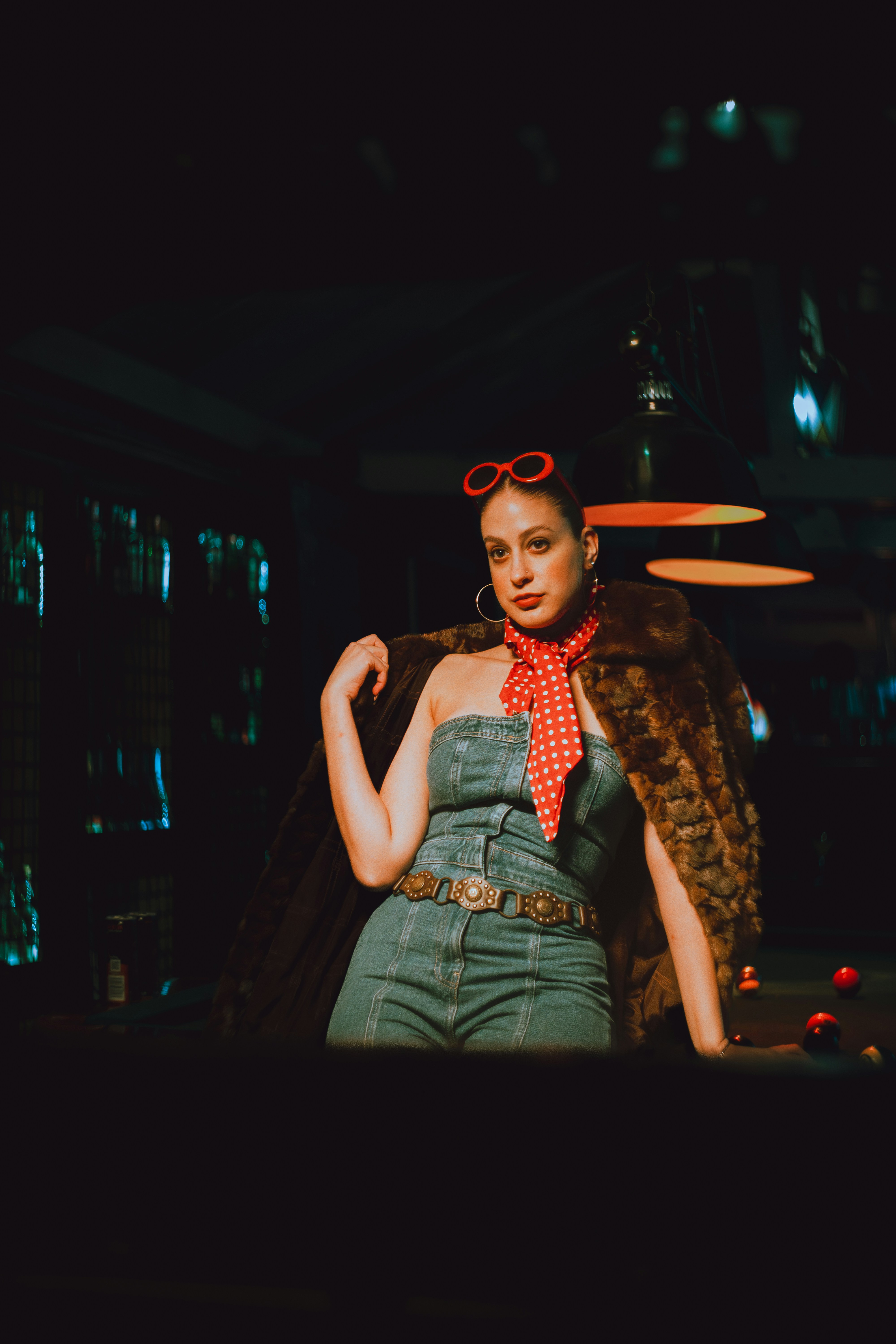 Red Scarf, Velvet Shadows: A Nightlife Portrait