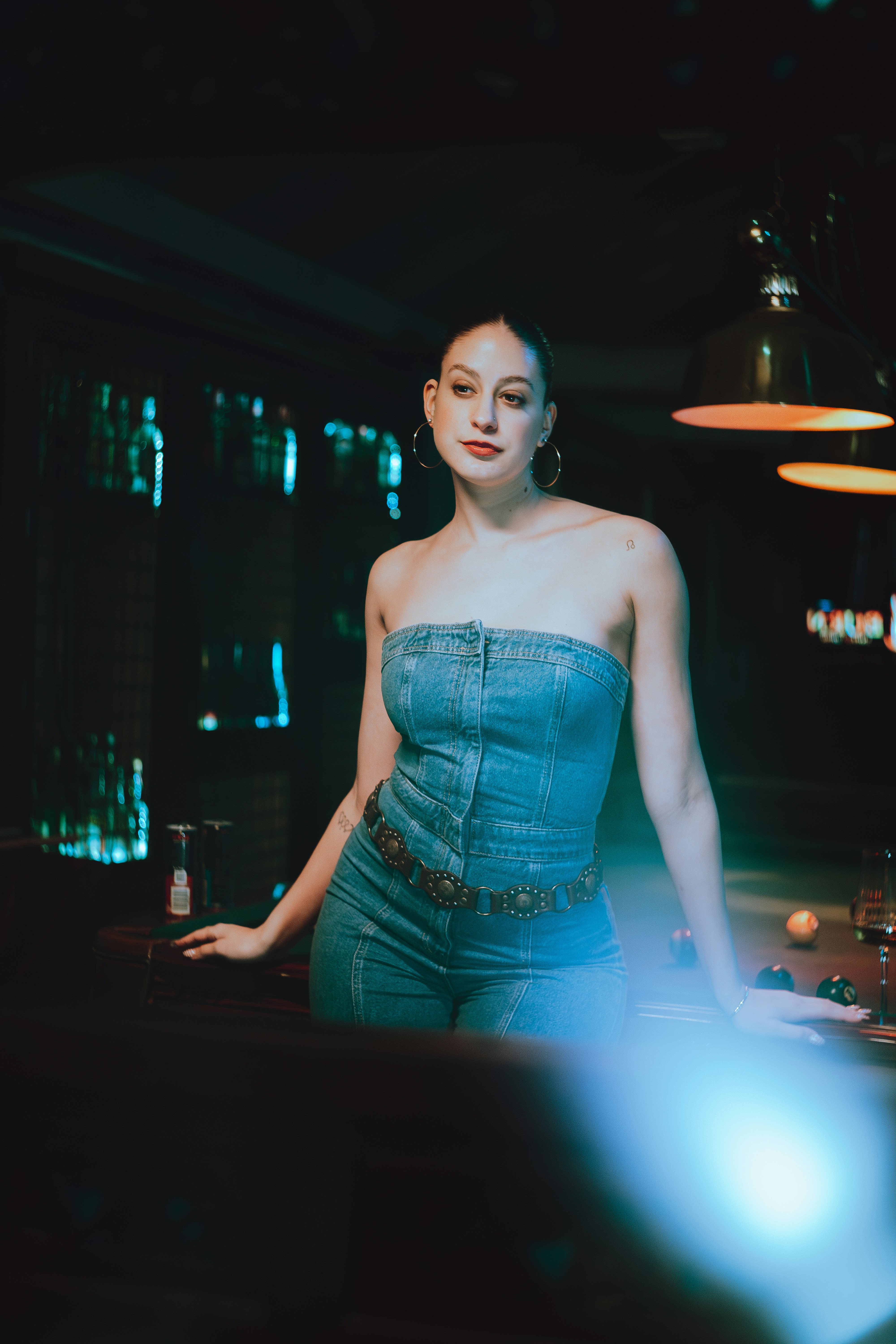 Denim silhouette at the neon bar