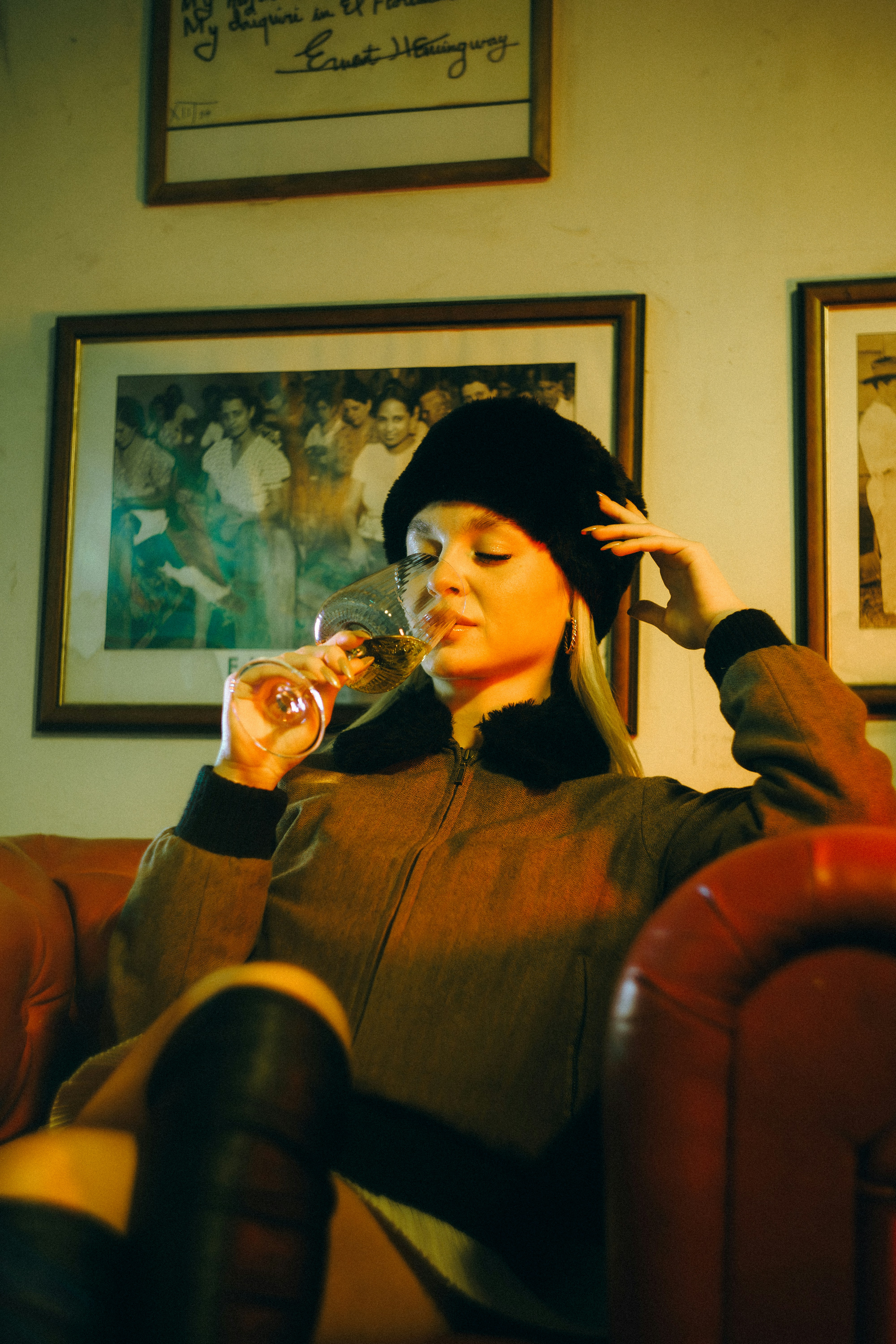 Wine Glass Reverie: A Quiet Moment in Velvet Room