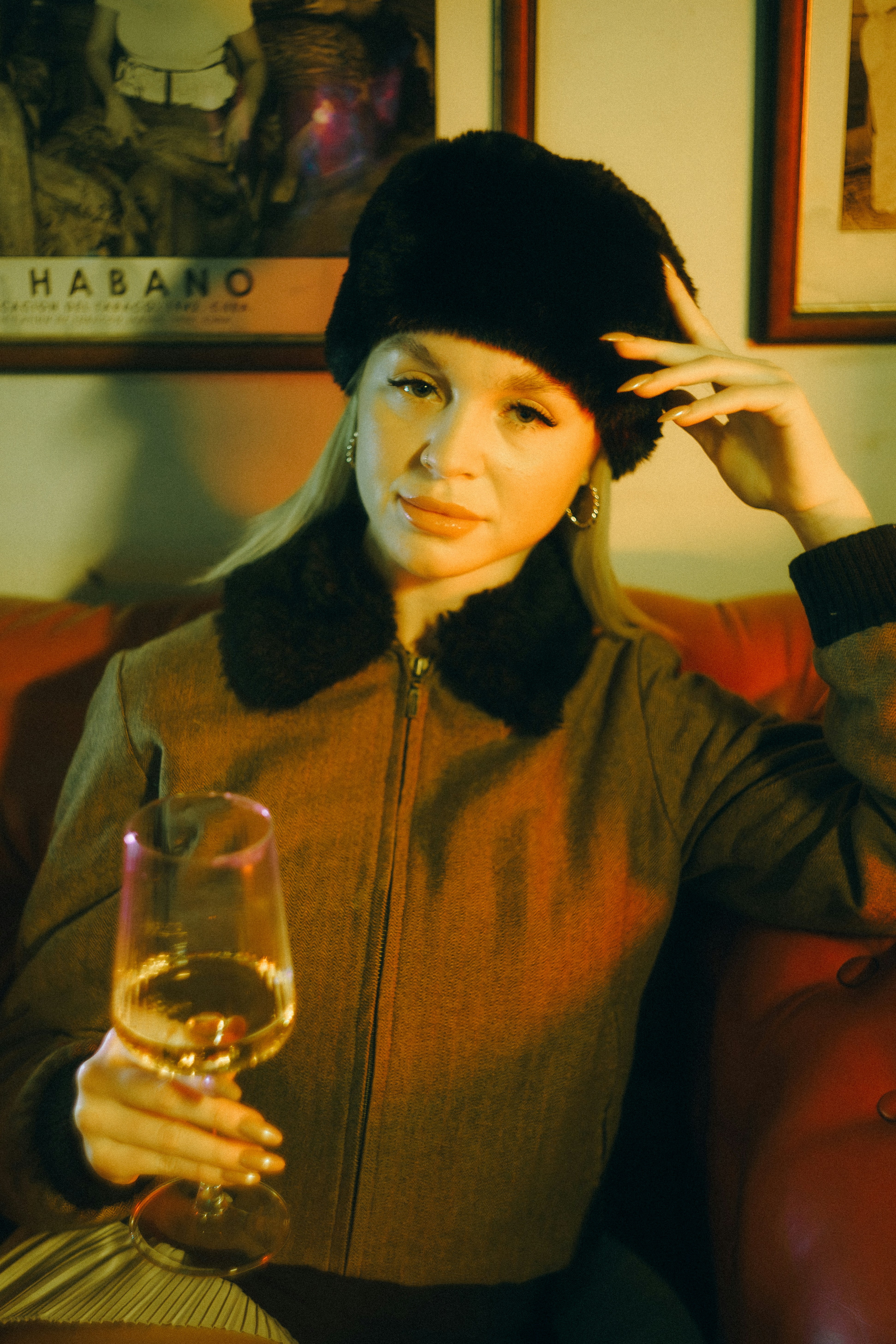 Amber-Eyed Lounge: A Quiet Moment with a Glass in Hand