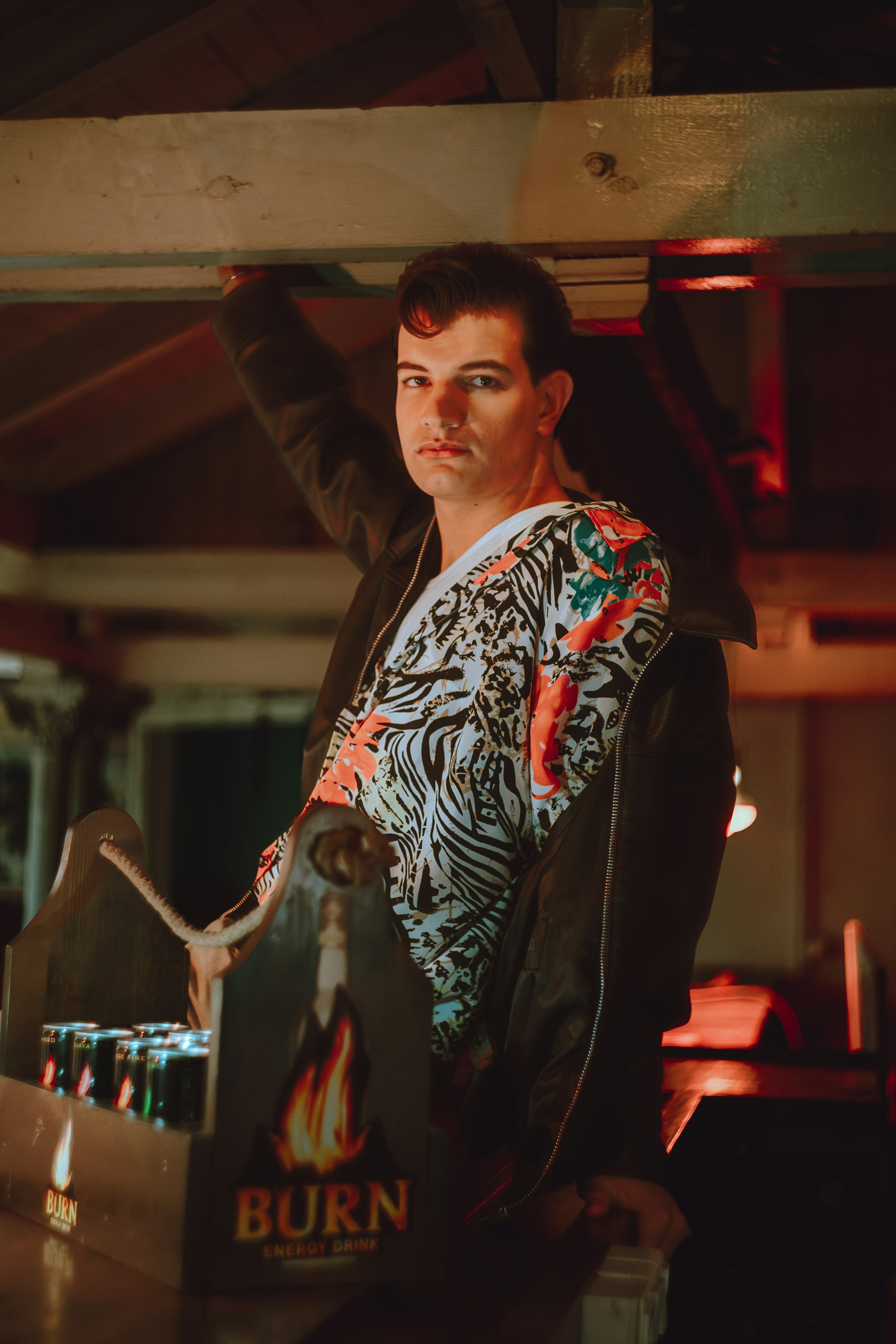 Under Neon Warmth: Portrait in a Dimly Lit Bar