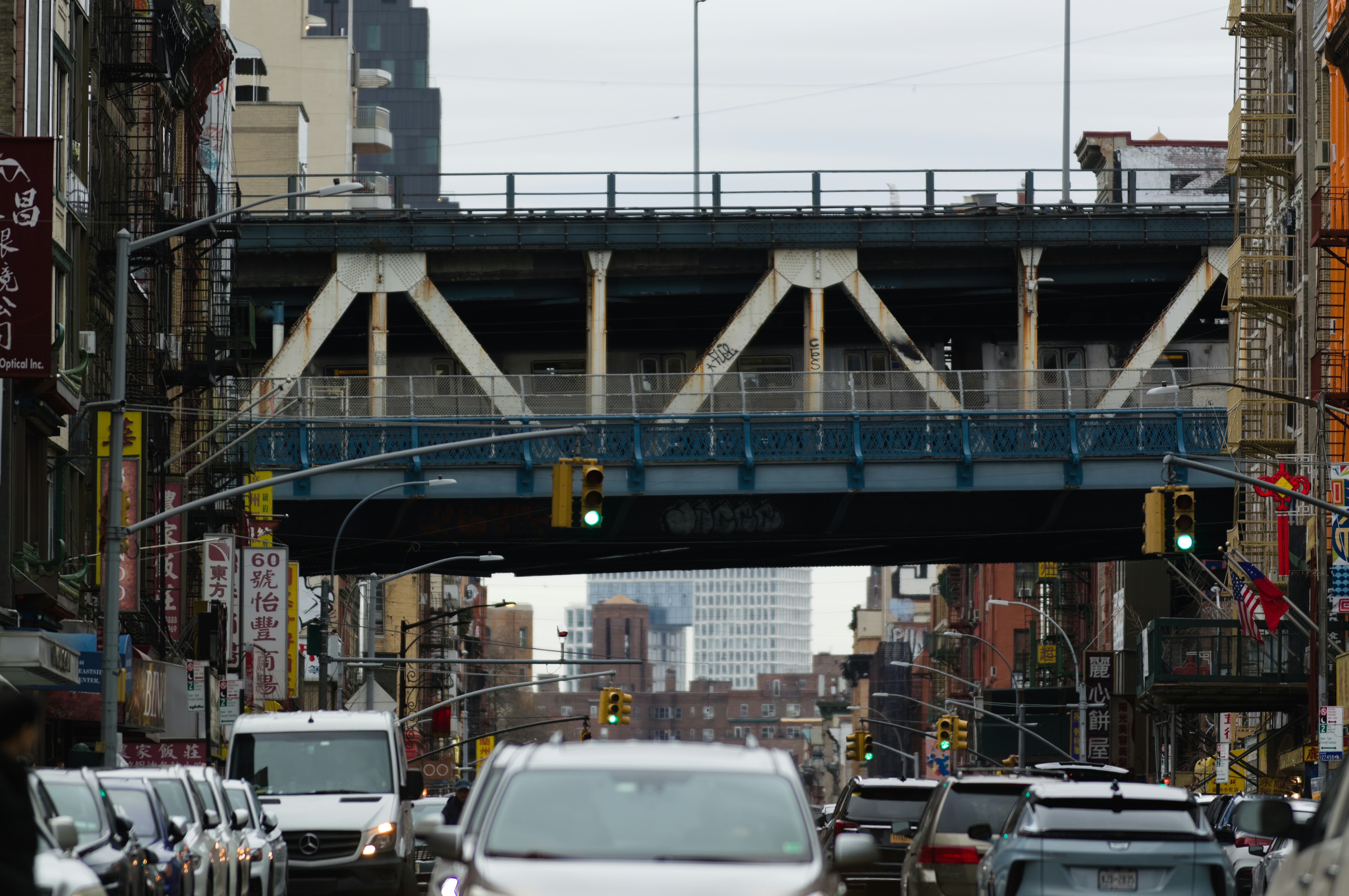 Street Corridor Beneath a Truss Bridge