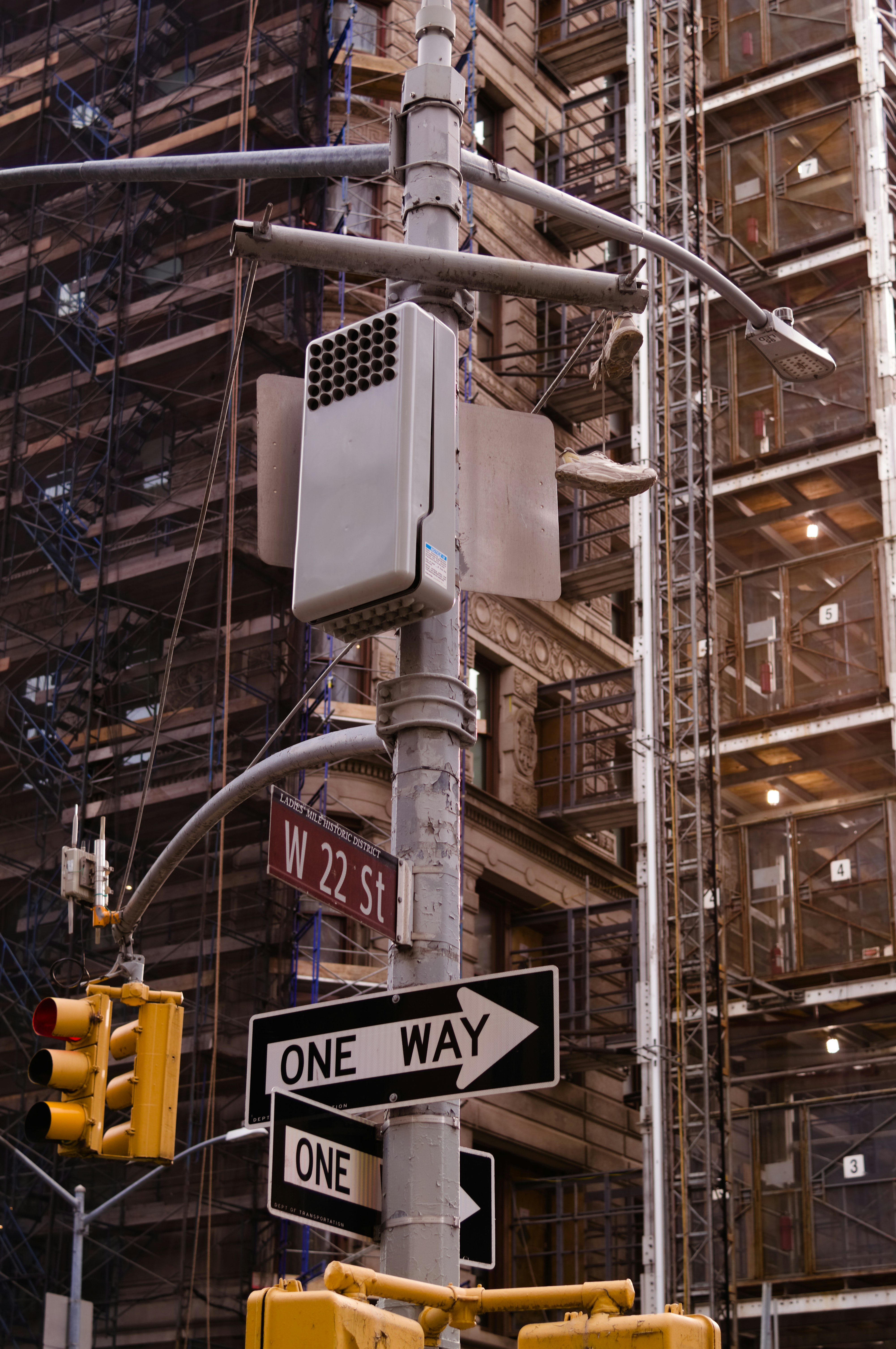 Industrial Crossroads: A Street Corner Amidstalke of Steel and Glass