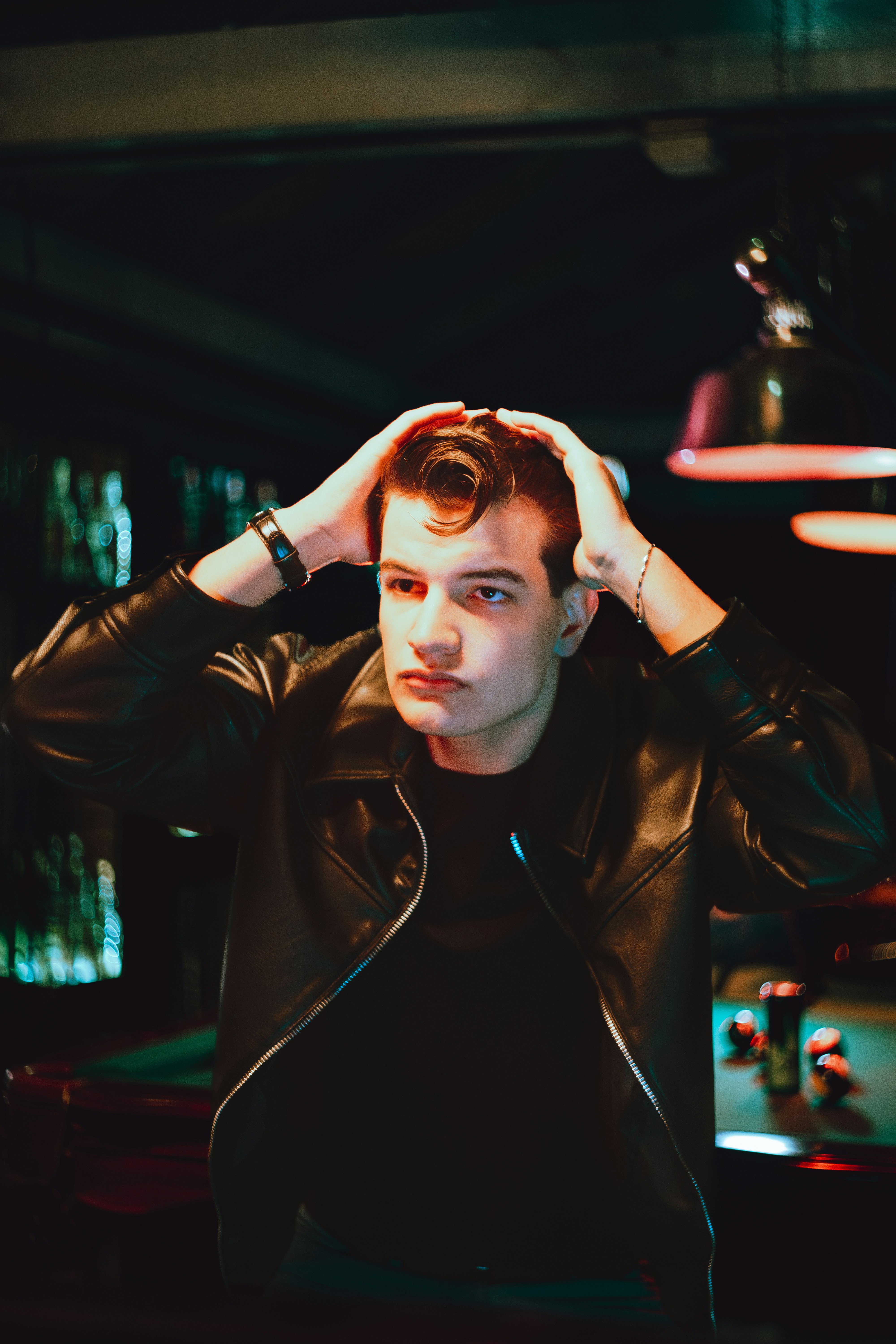 Midnight Rebel: A Moment of Contemplation in Neon Light