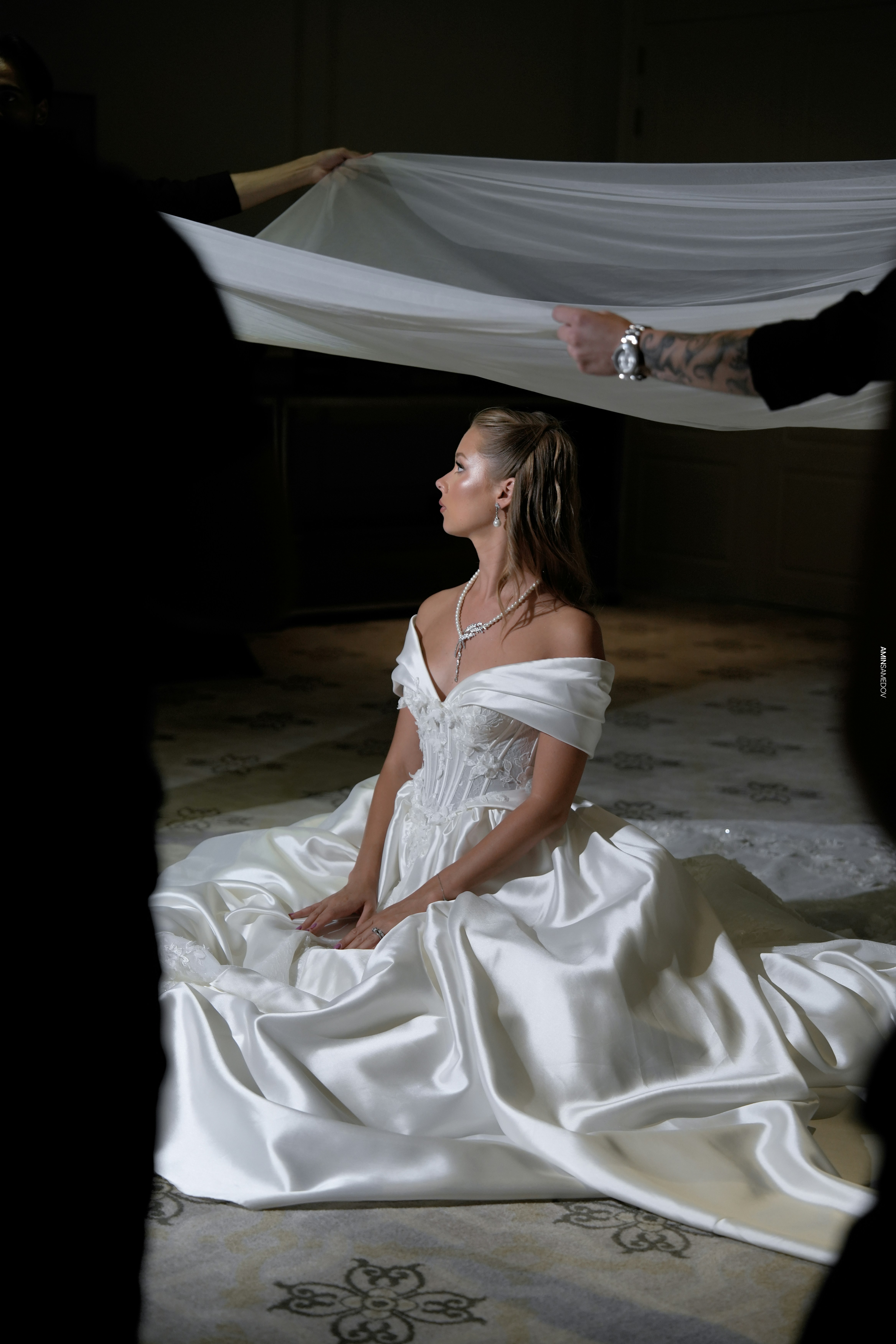 Bride in White Beneath the Draped Veil