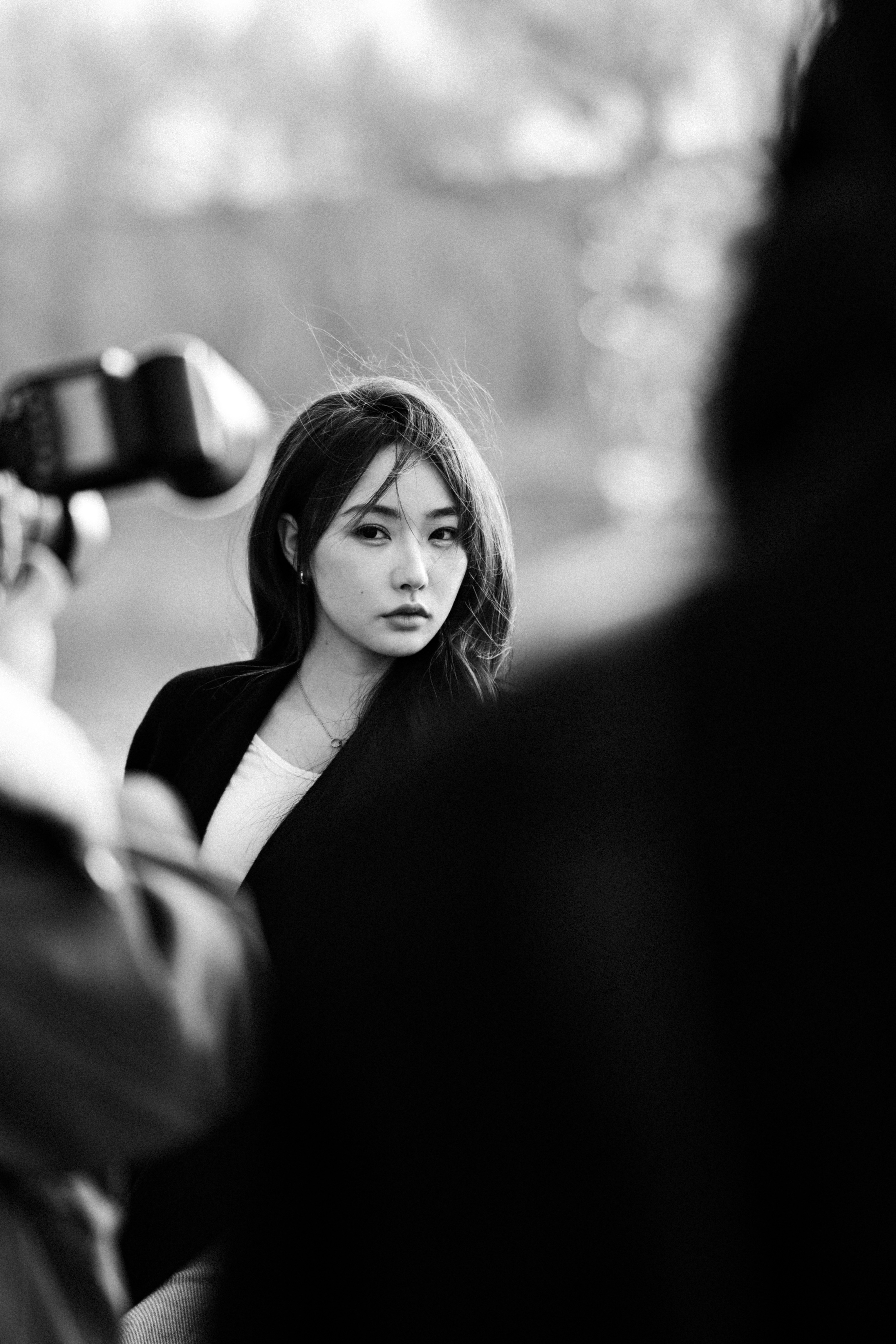 Quiet Gaze Behind the Lens: A Portrait in Monochrome