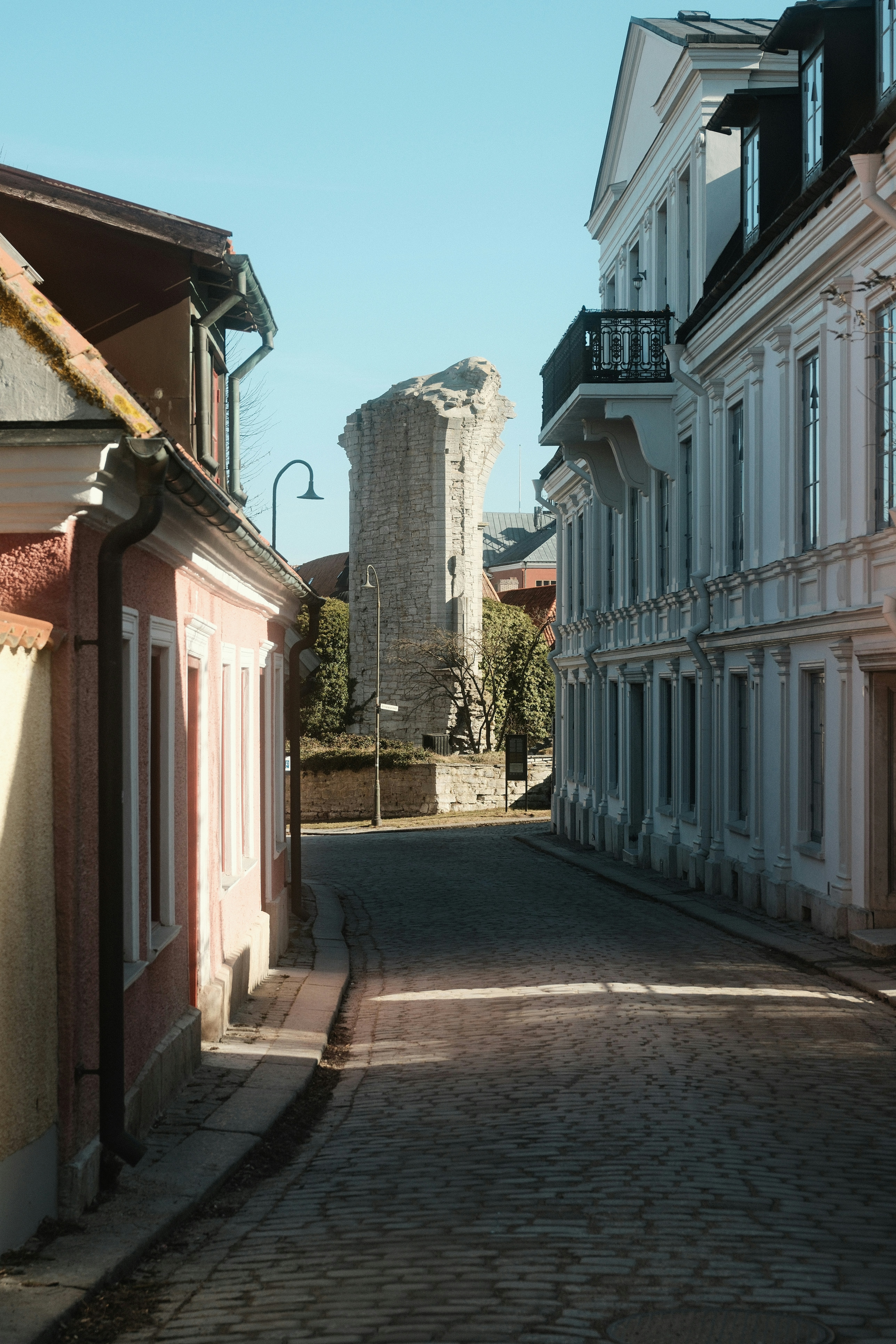 Between Timeworn Stone and Kaleidoscopic Facades