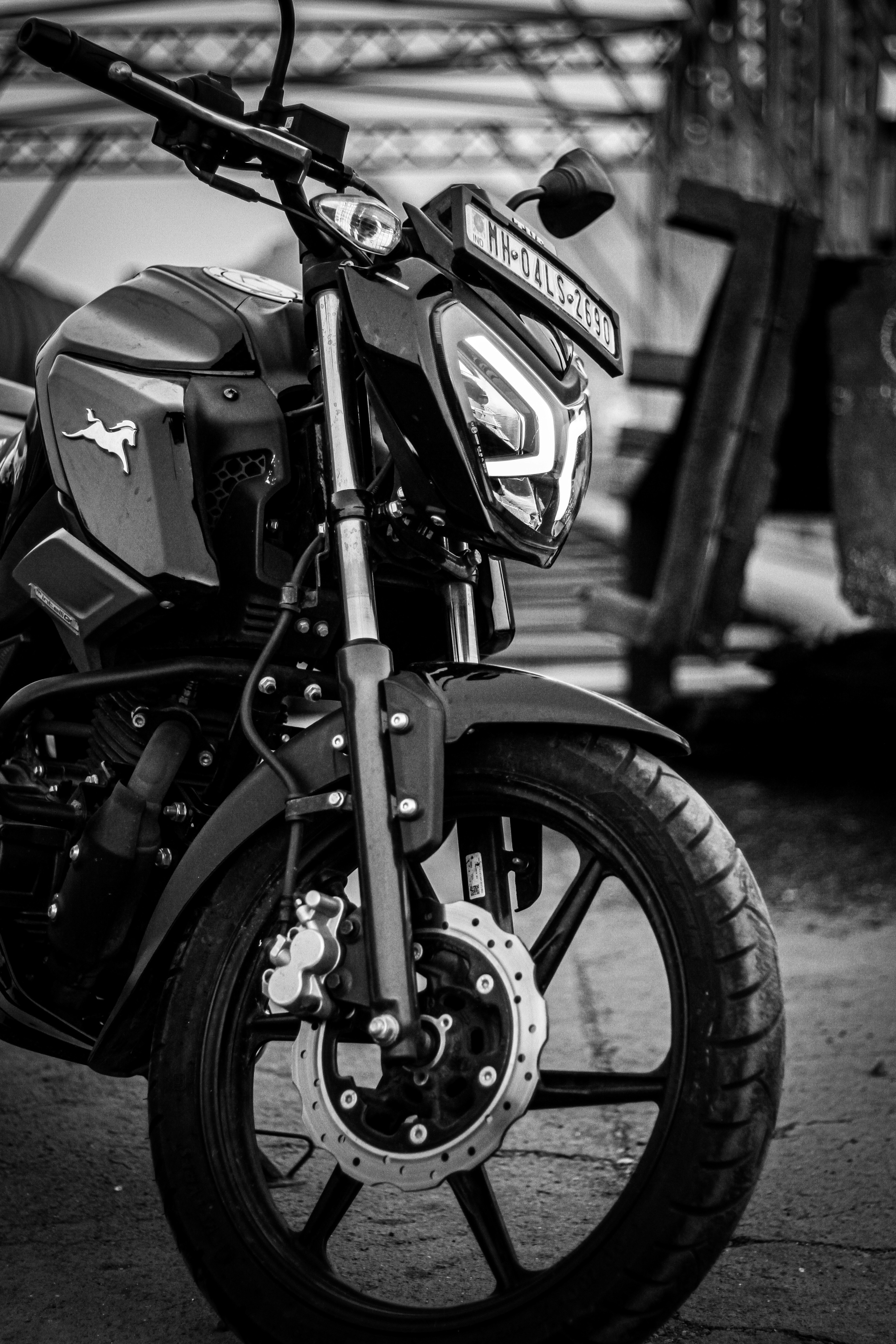 Urban Pulse: the Moto Stands Bold on a Quiet Street