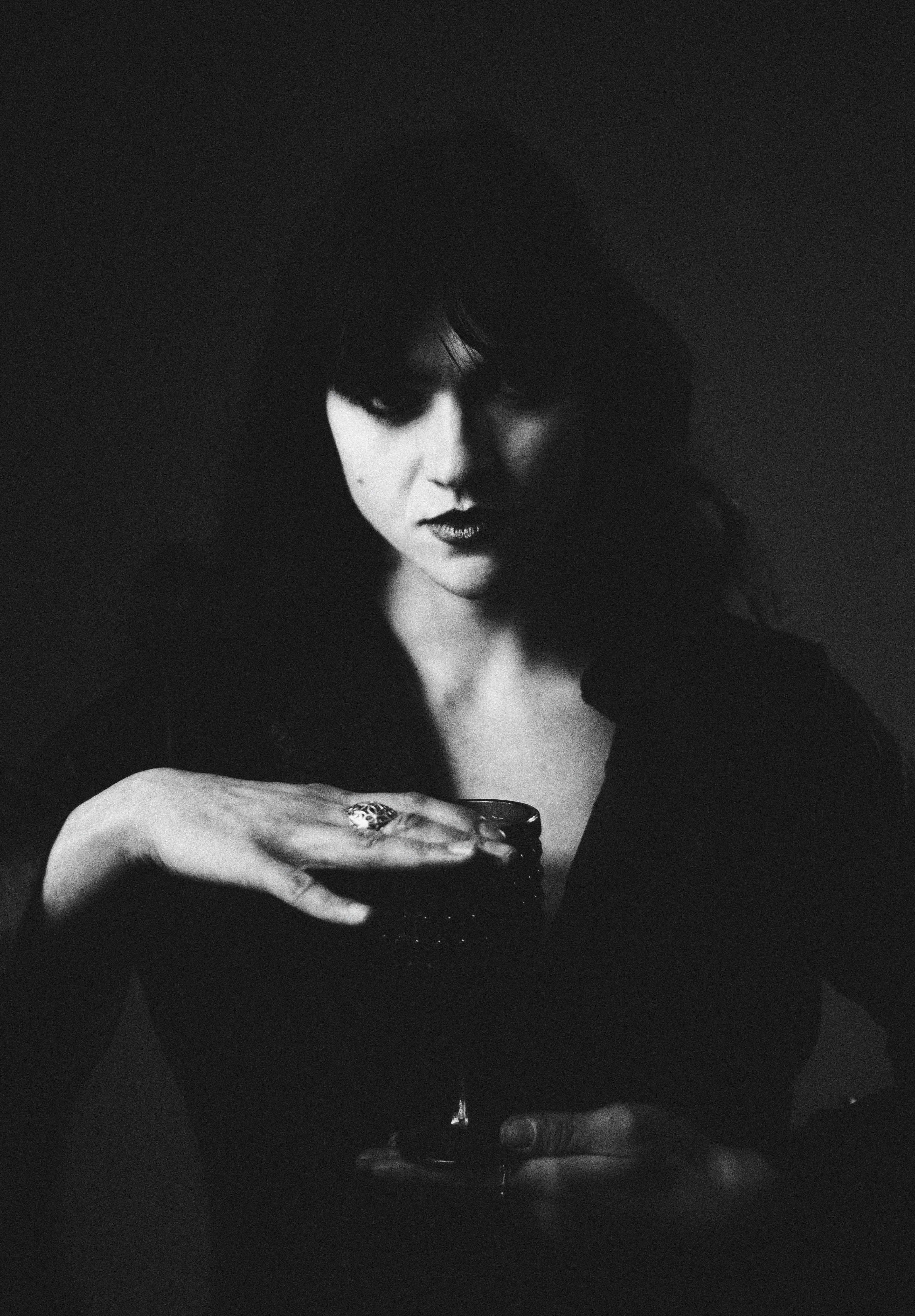 Midnight Glass: A Quiet Portrait in Shadowed Glamour