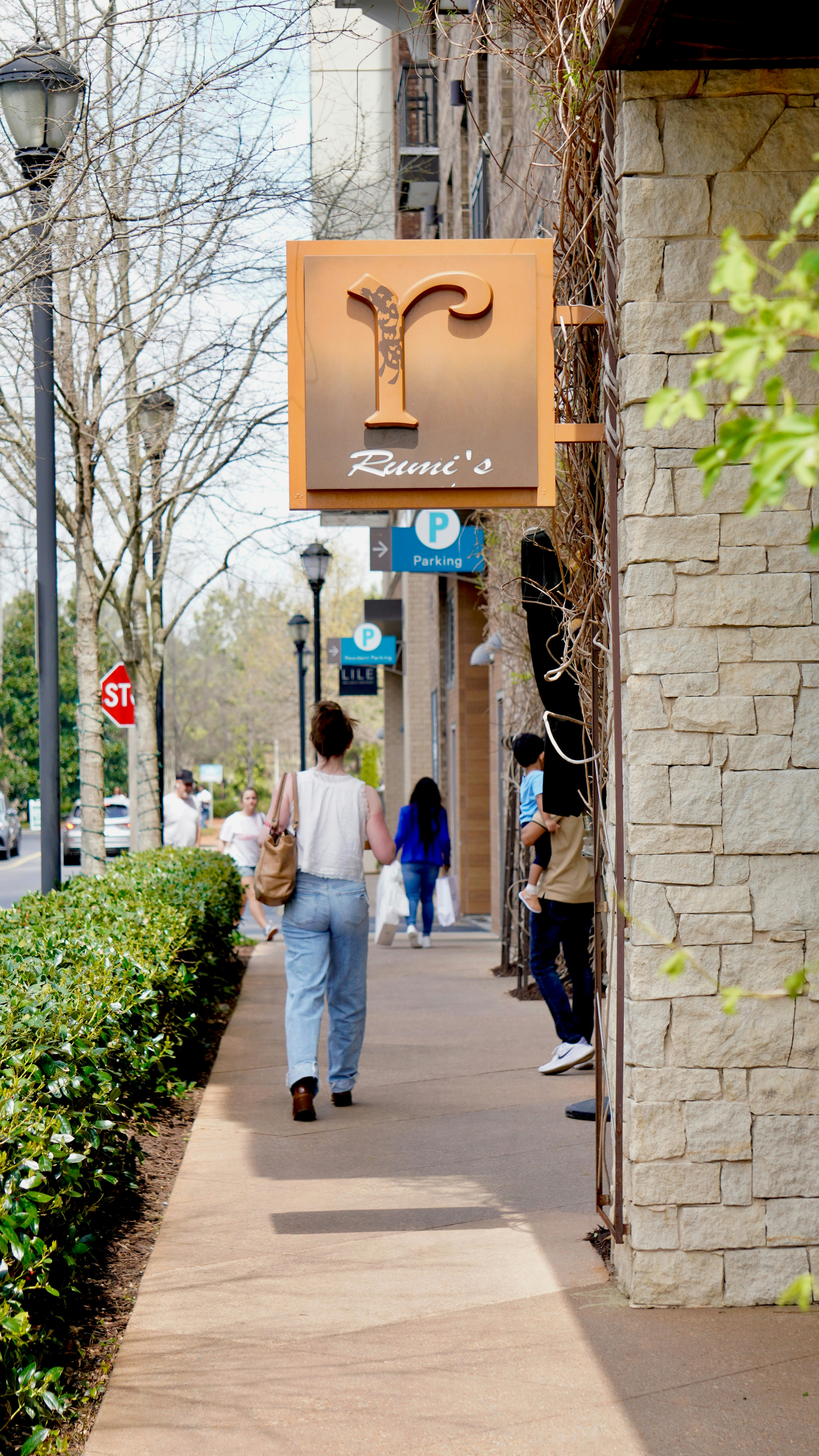 Urban signpost: Rami's doorway to a sunlit sidewalk
