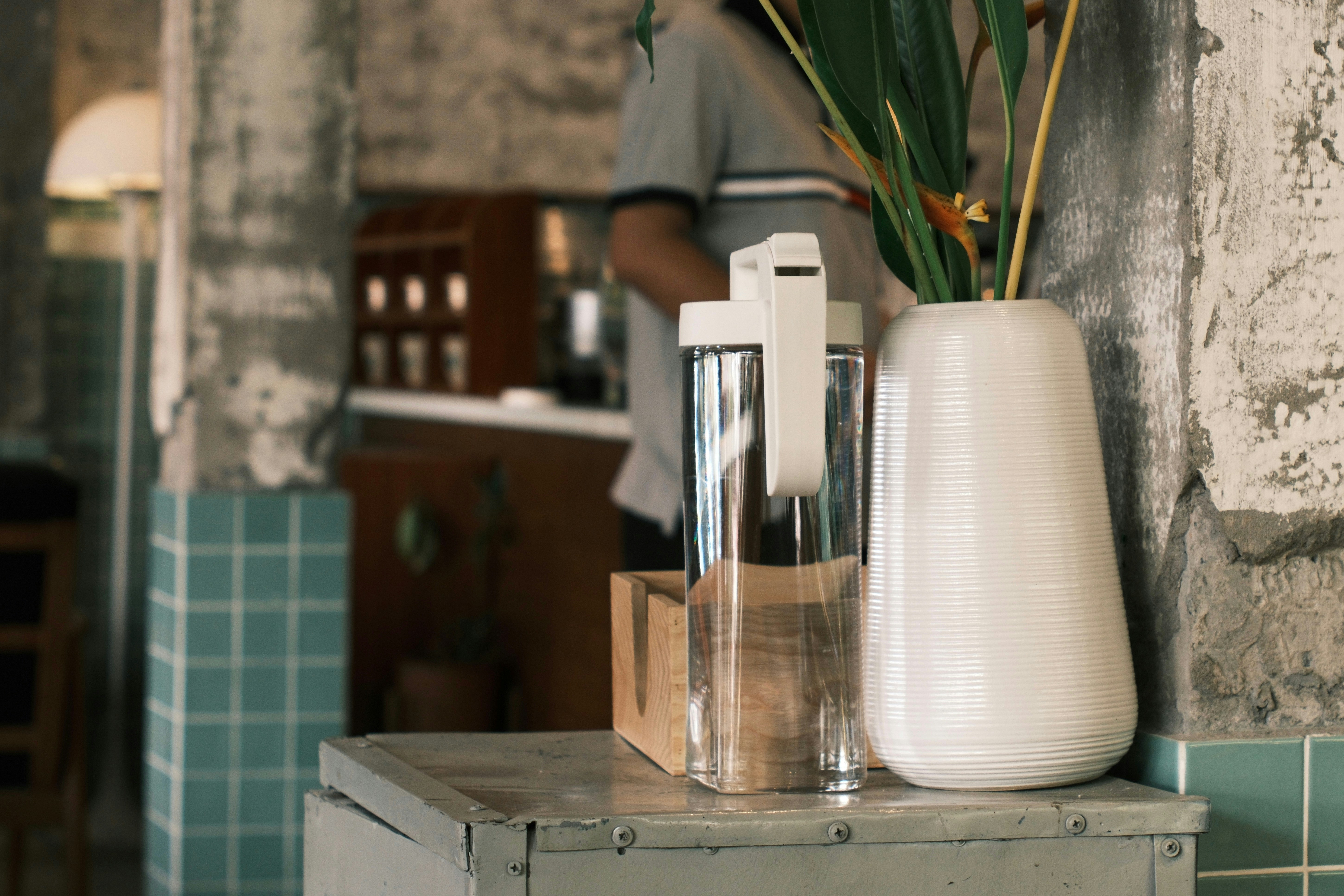 Ceramic Vase and Glass Carafe on a Cleared Counter