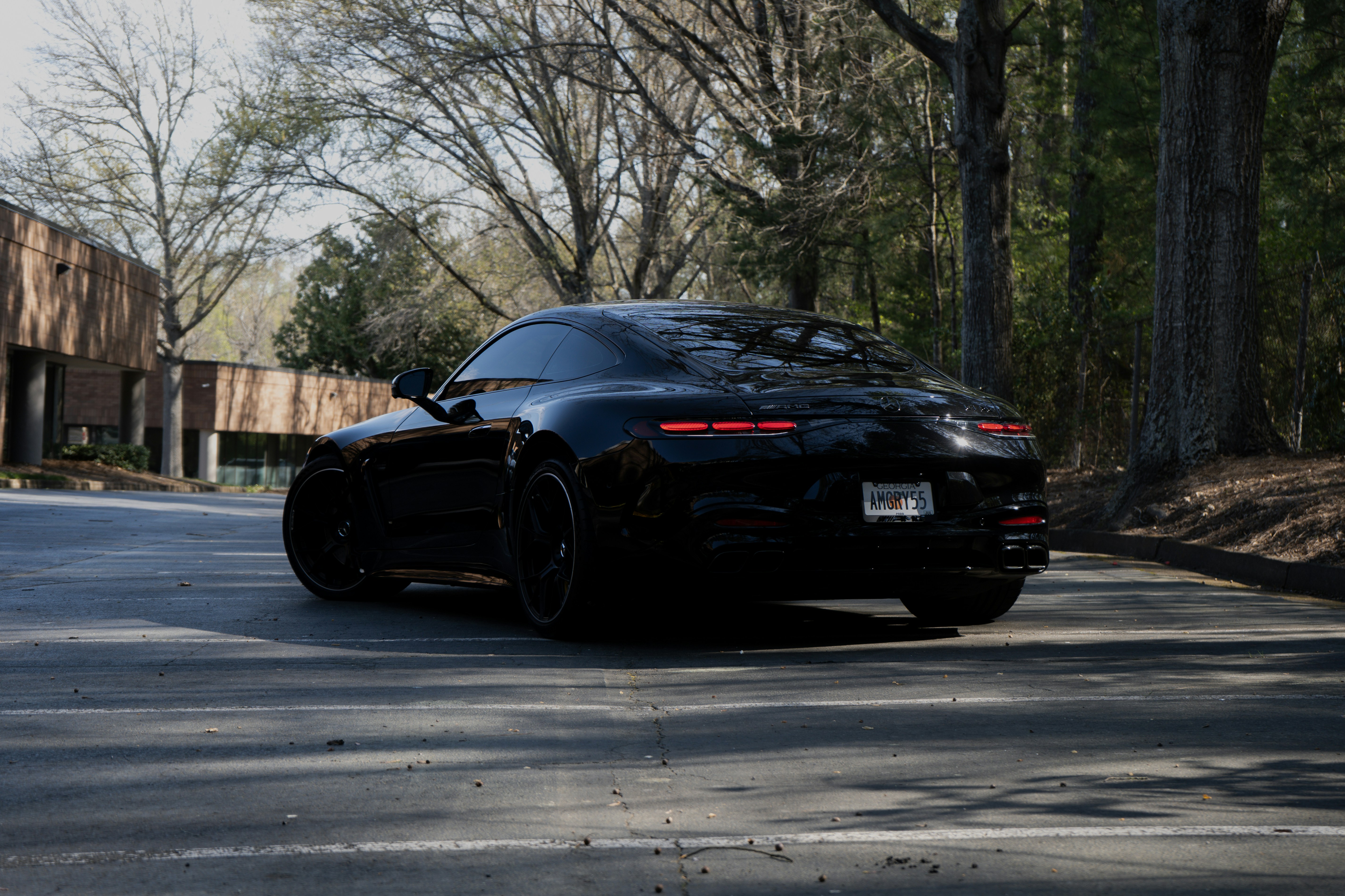 Midnight Torque: A Sleek Porsche Anchored by Shadow and Streetlight