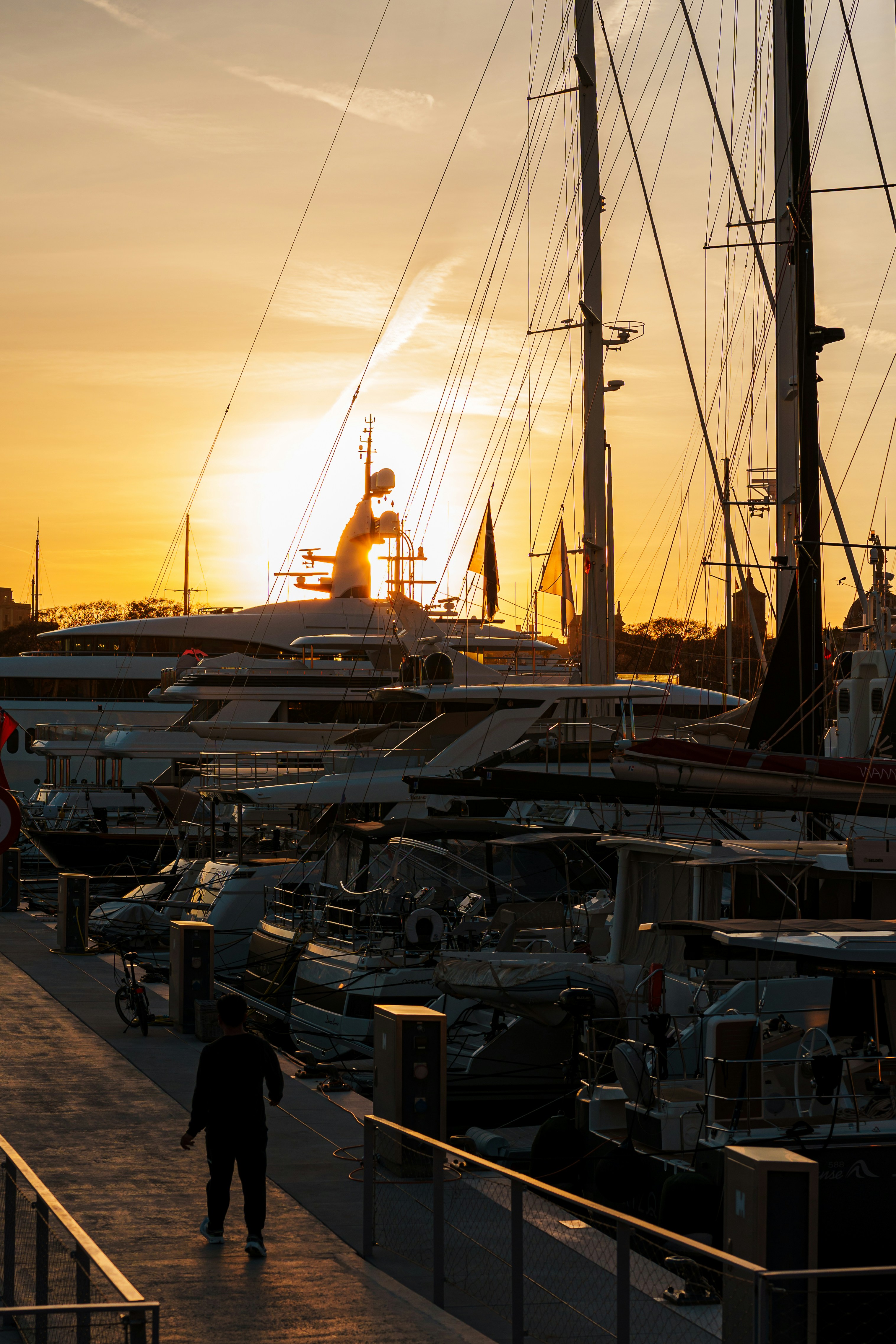 Sunset at the Marina: Silhouettes and Fleet