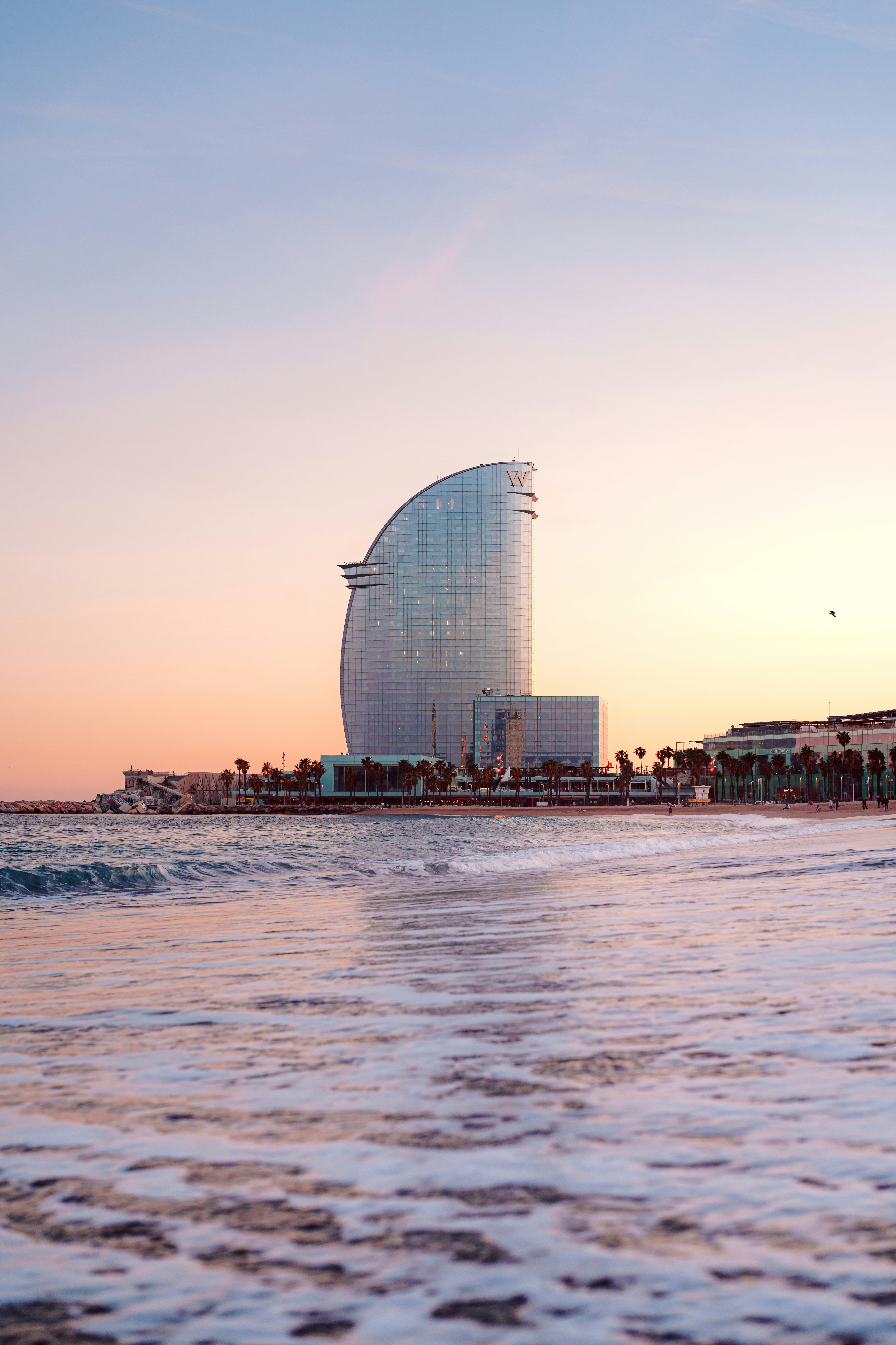 Sunset Silhouette Over Barcelona’s Coastal Jewel