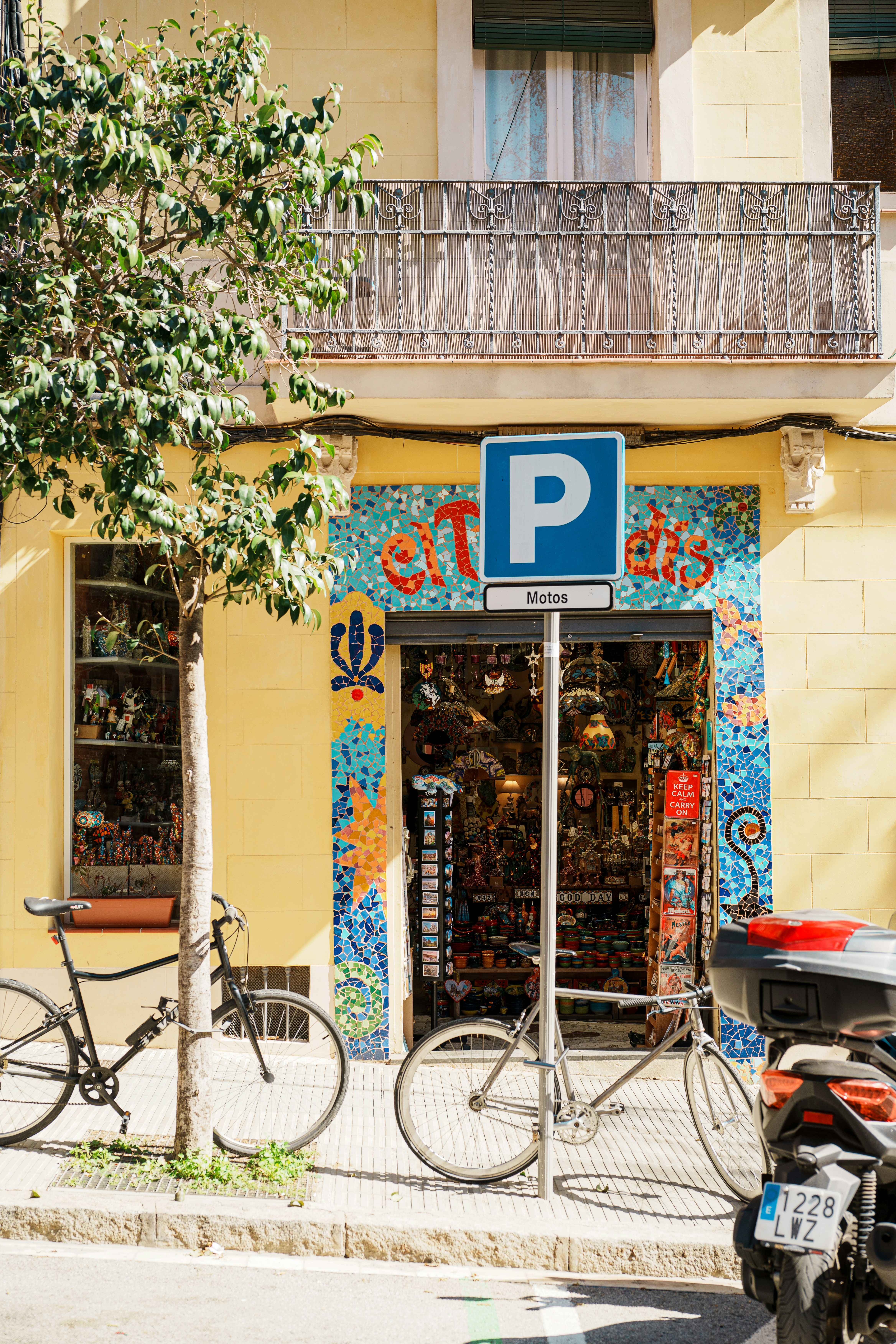 Colorful Shopfront Under the Parking Sign