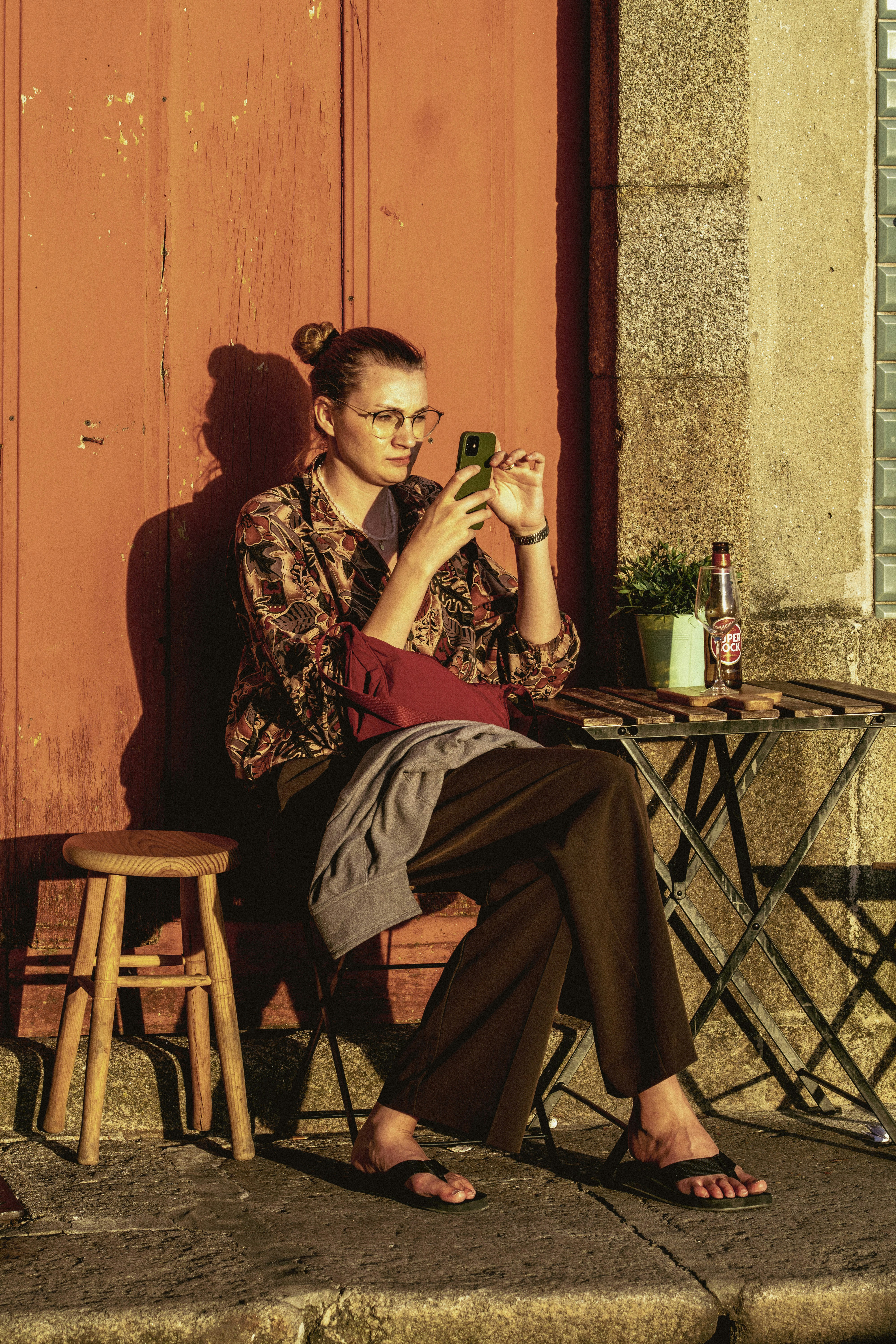 Solitary Focus: Quiet Portrait on a Sunlit Street