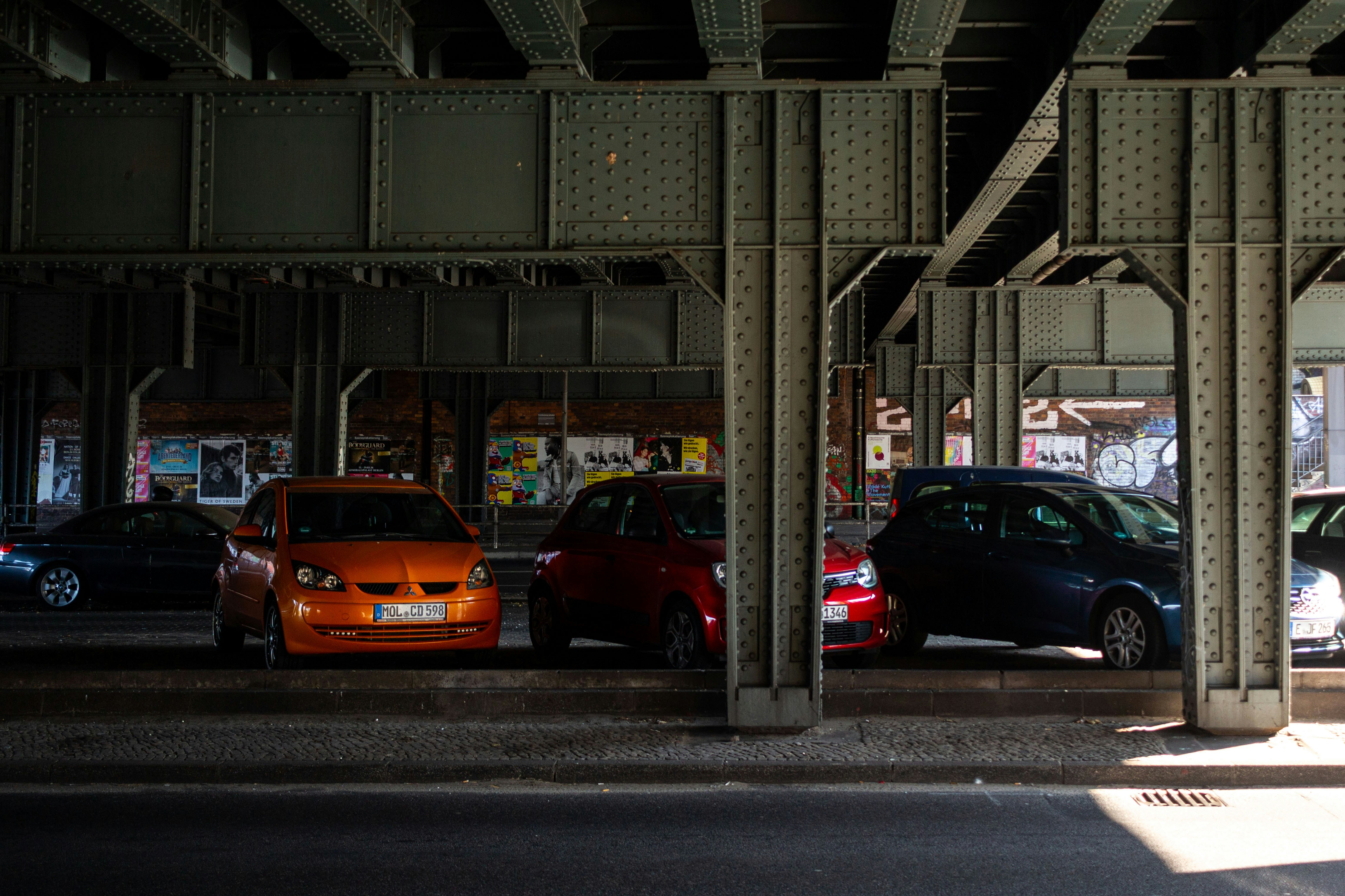 Under the Archway: Street Level Parking Beneath Steel Beams