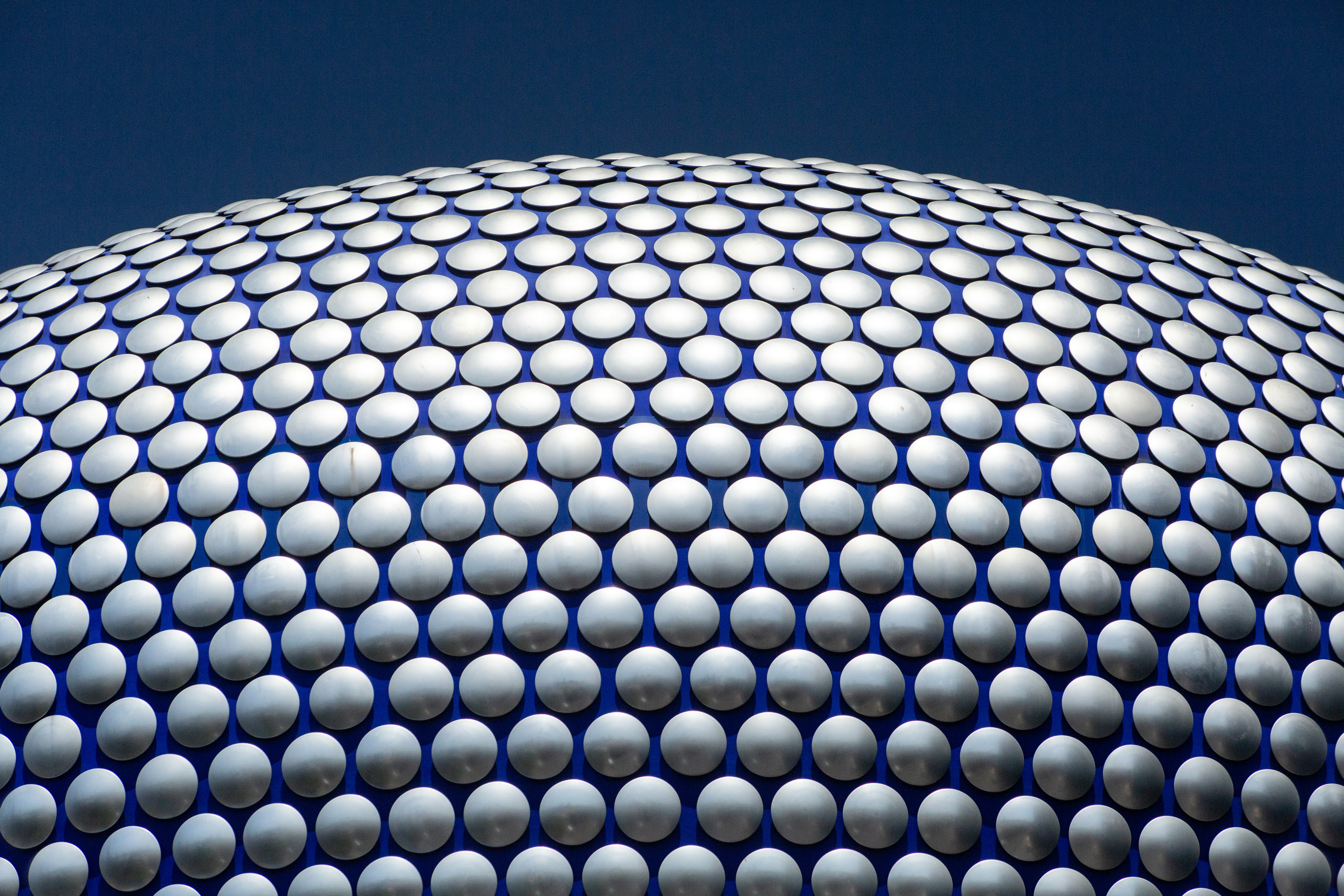 Lavish Dome of Orbs: The Curved Sea of Spherical Facades