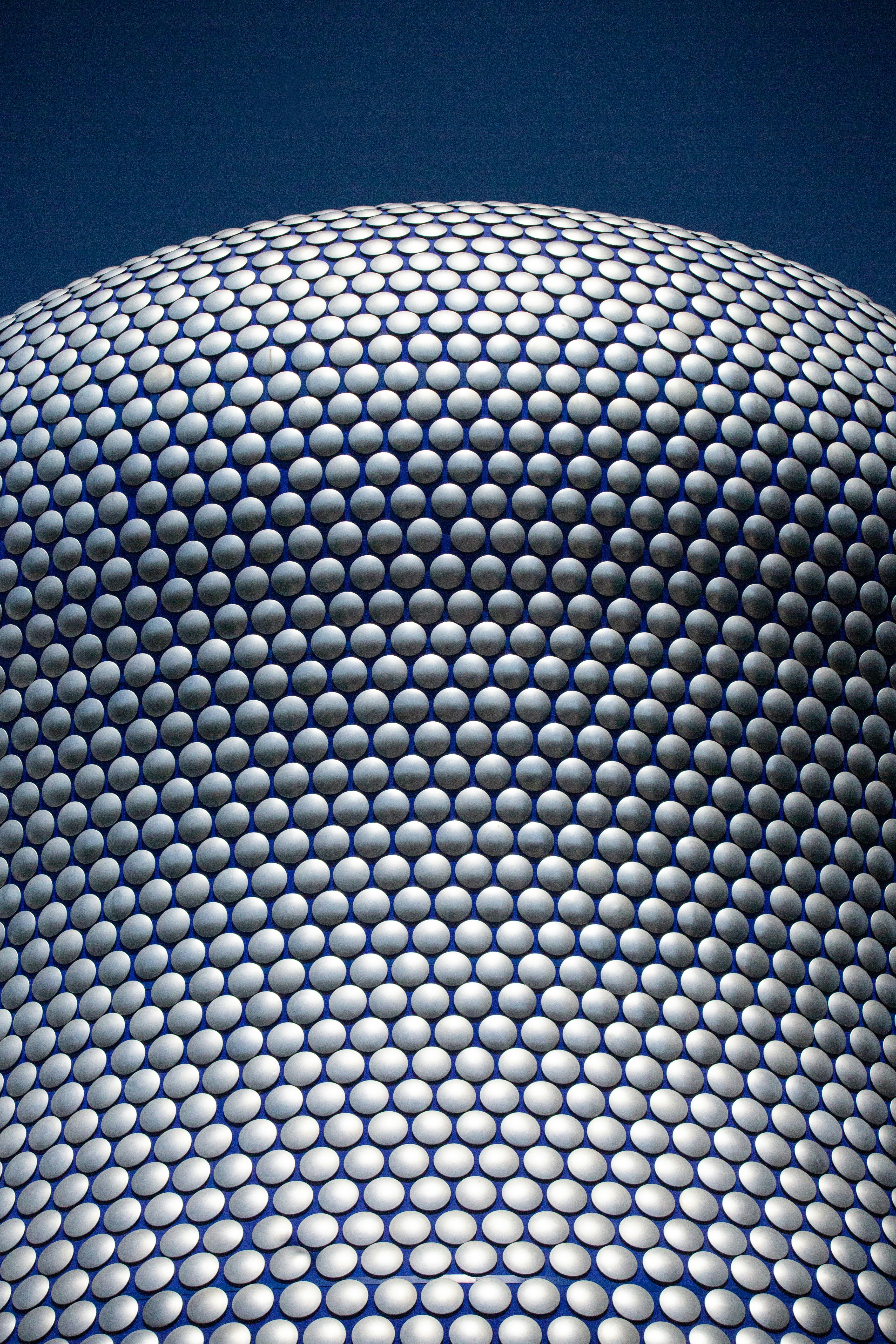 Dome of Dots: A Curved Sea of Metallic Orbs