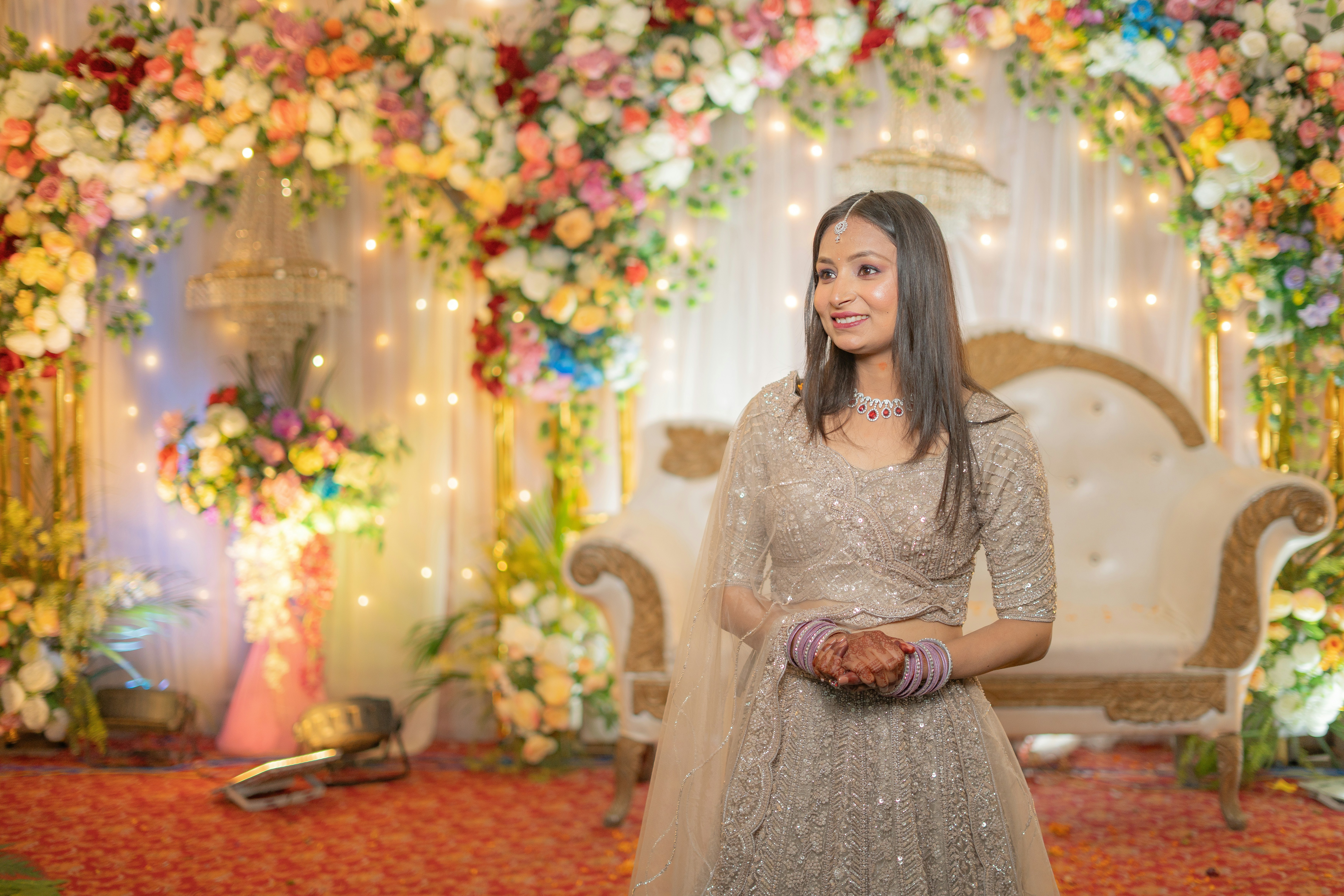 Elegance in Bloom: A Festival Bride in a Hall of Flowers