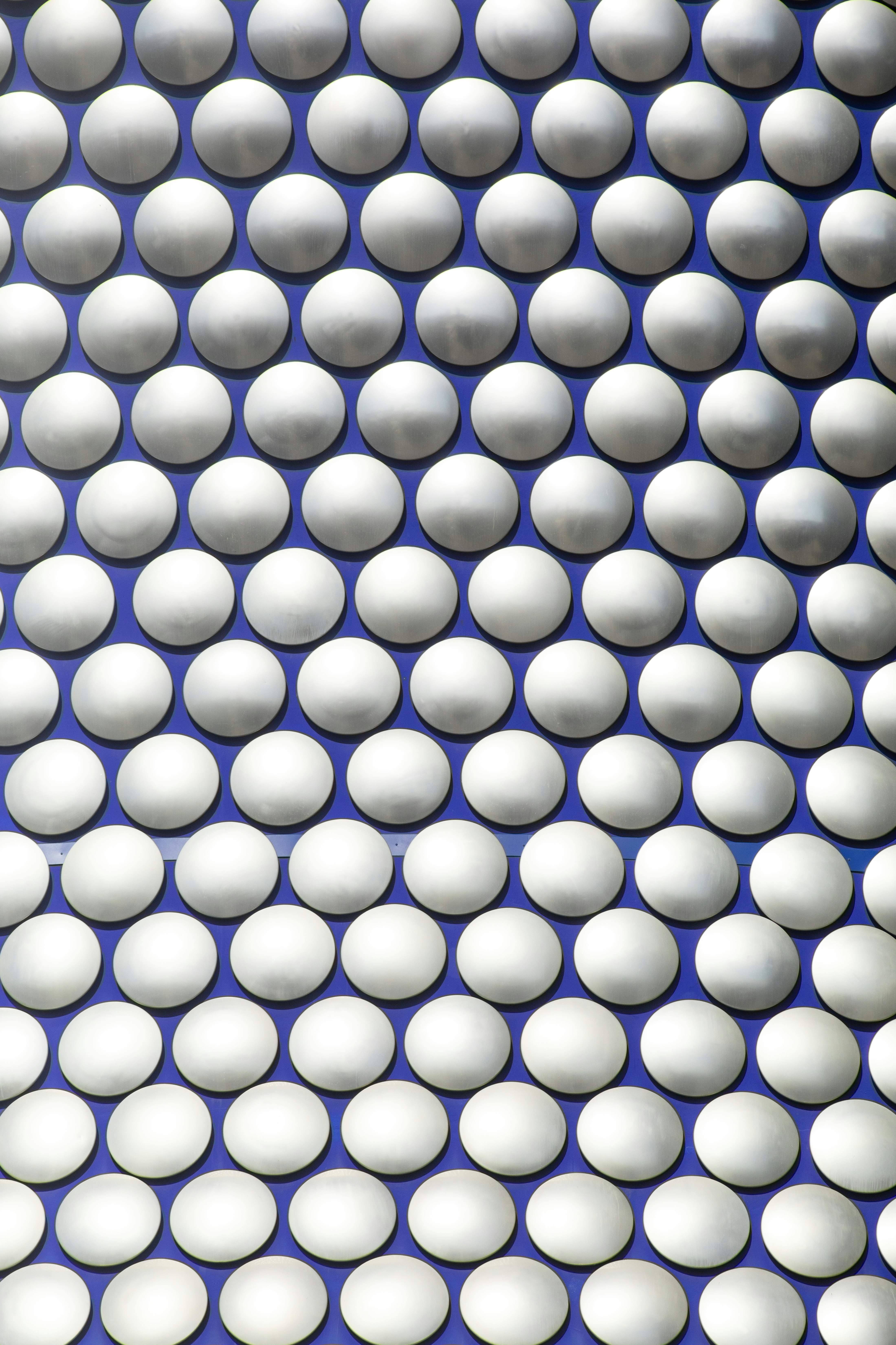Ridge of Round Ellipses: A Metallic Mosaic of Repetition