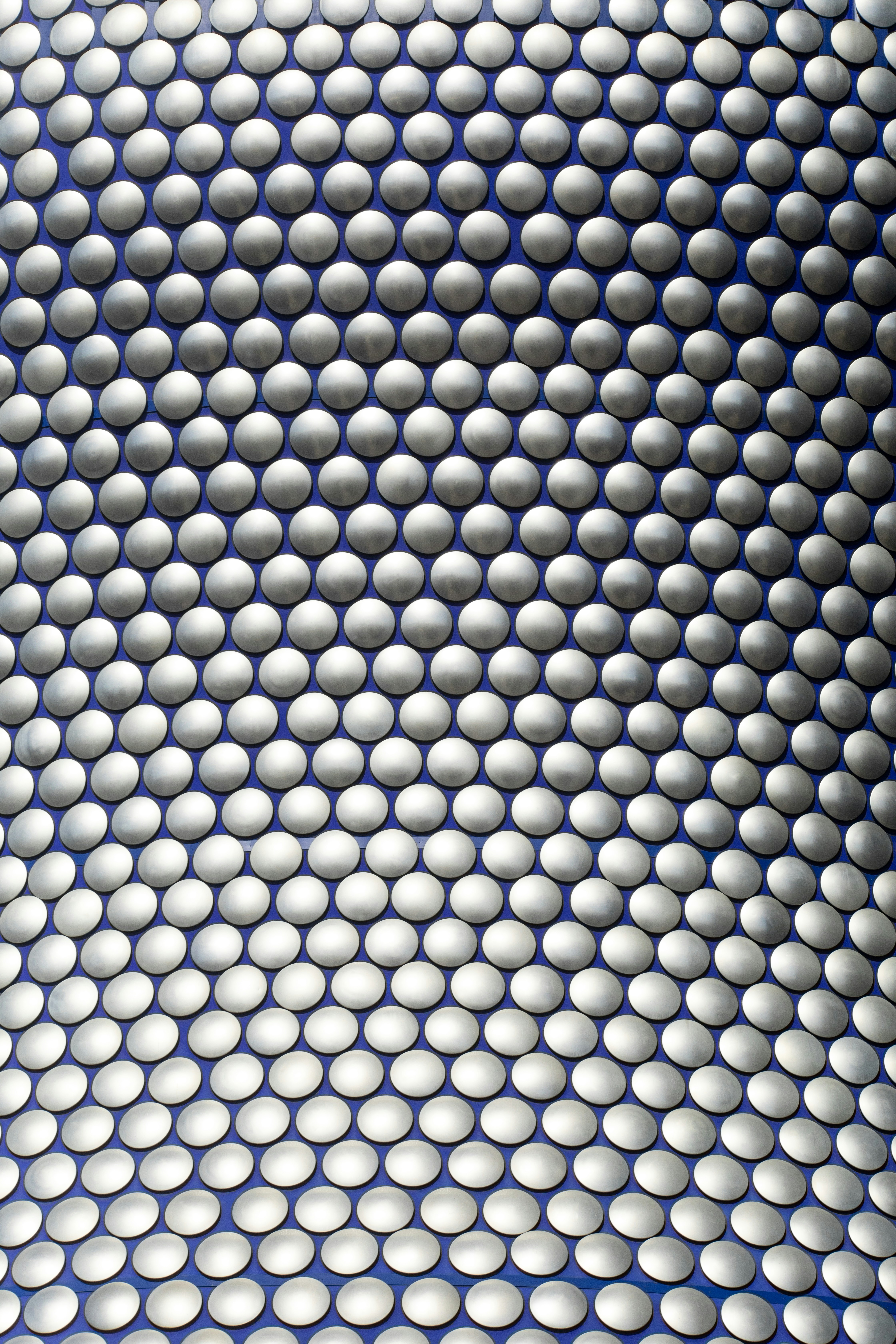 Rhythmic Orbs: A Macro Quilt of Metallic Spheres